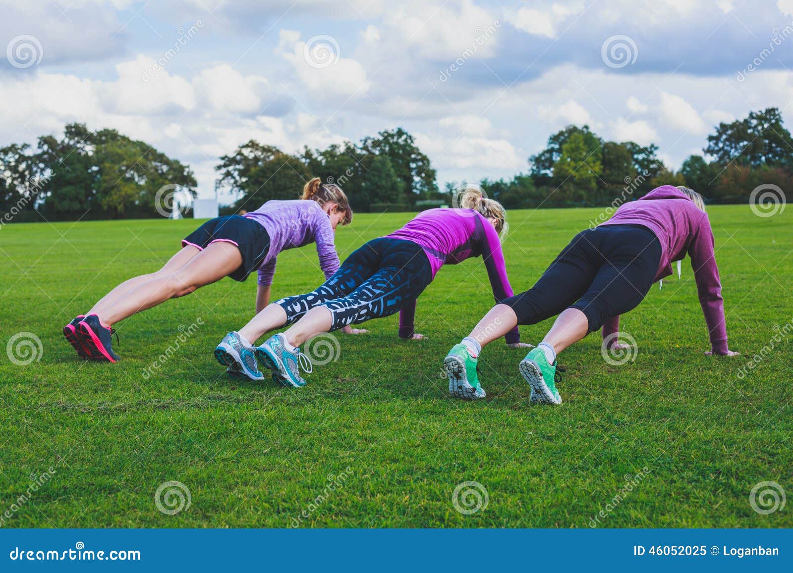 Three Women Doing Push Ups in Park Stock Image - Image of friends, park ...