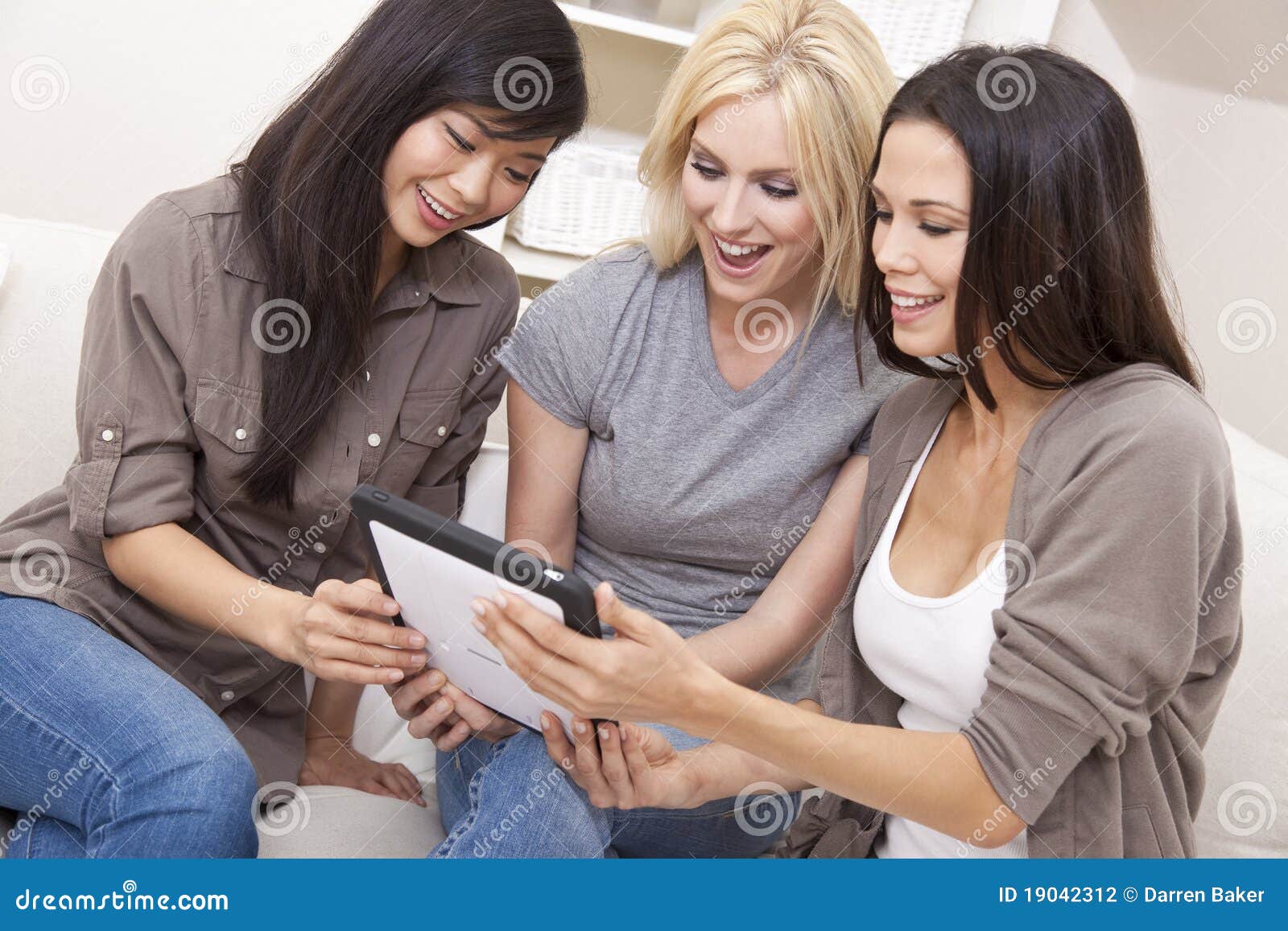 Three Women Friends Using Tablet Computer Stock Photo - Image of home ...