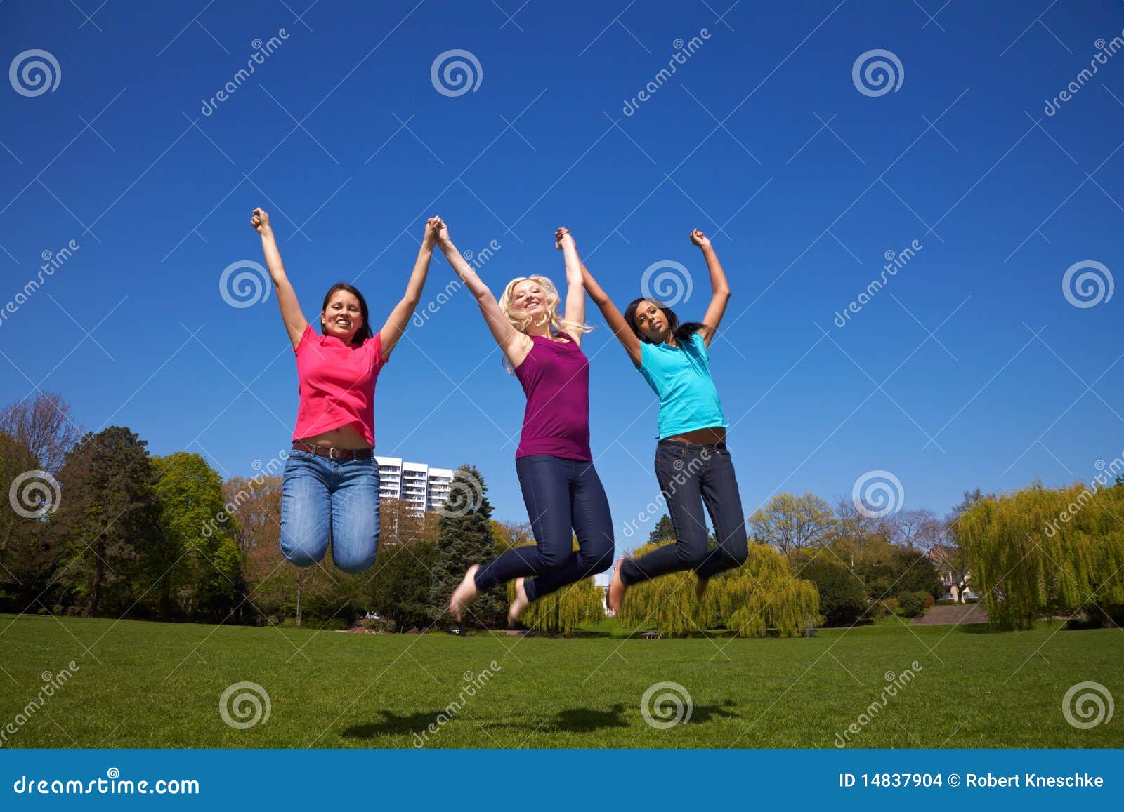 Three Women Jumping into the Air Stock Photo - Image of celebration ...