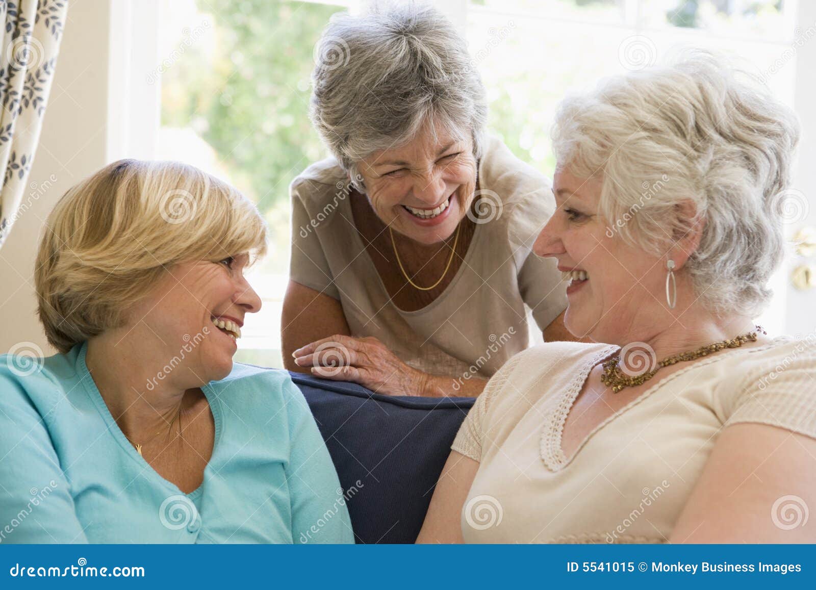 Three Women in Living Room Talking and Smiling Stock Image - Image of ...