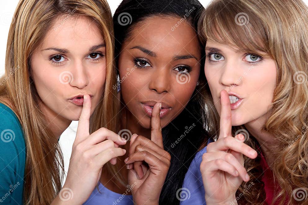 Three women shushing stock image. Image of friends, hands - 26792725