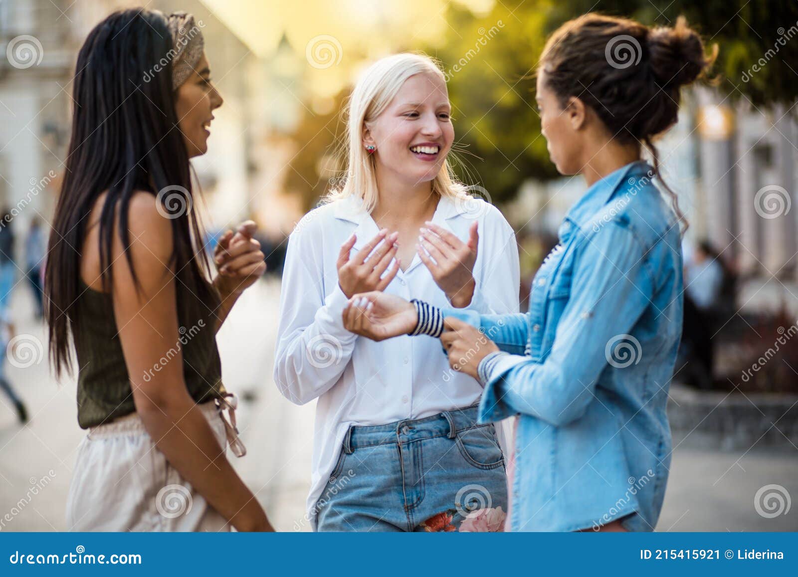 Gossip. Three Women Standing on Street and Talking Stock Image - Image ...