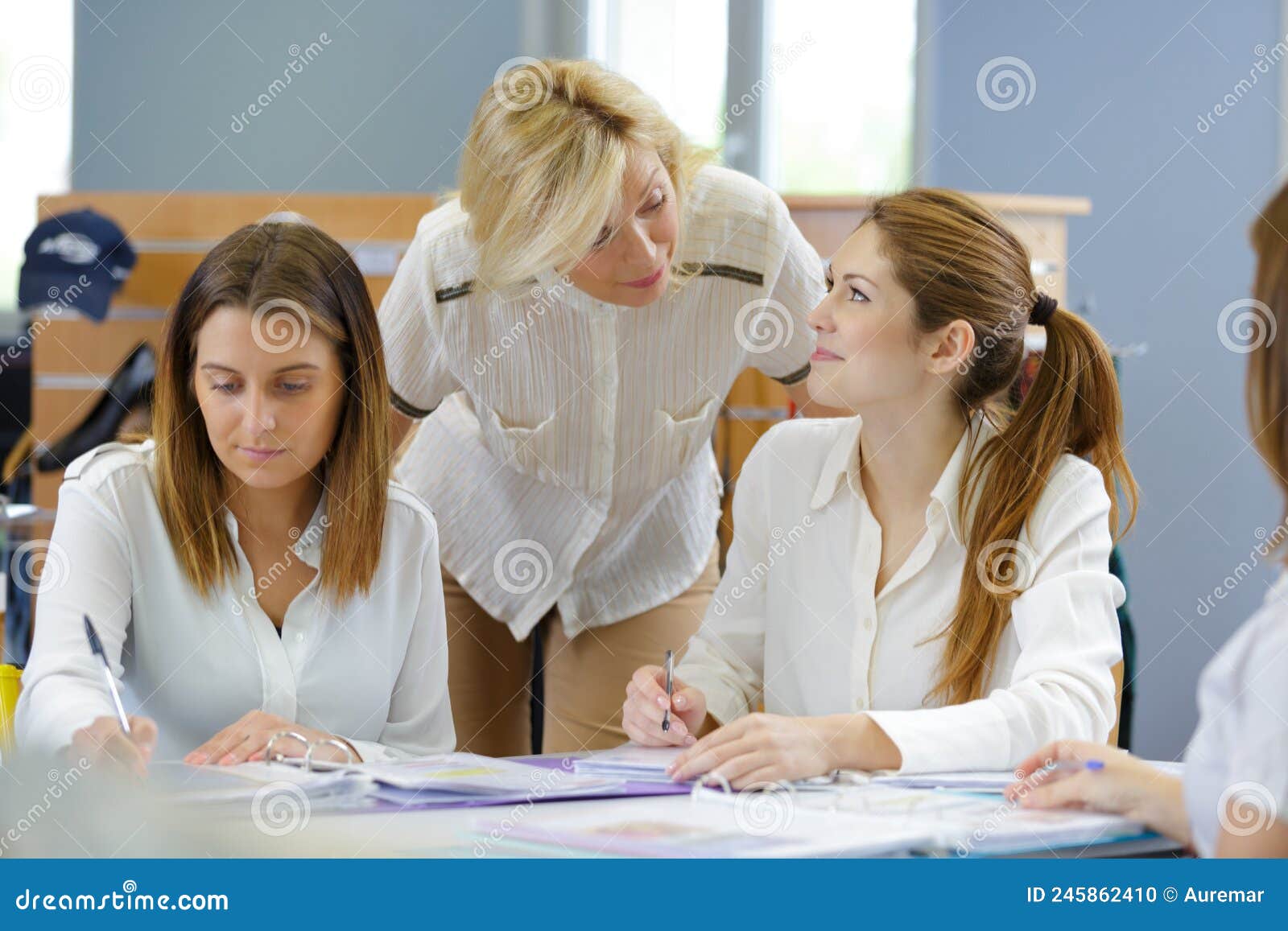 Three Women Working on Project Stock Photo - Image of model ...
