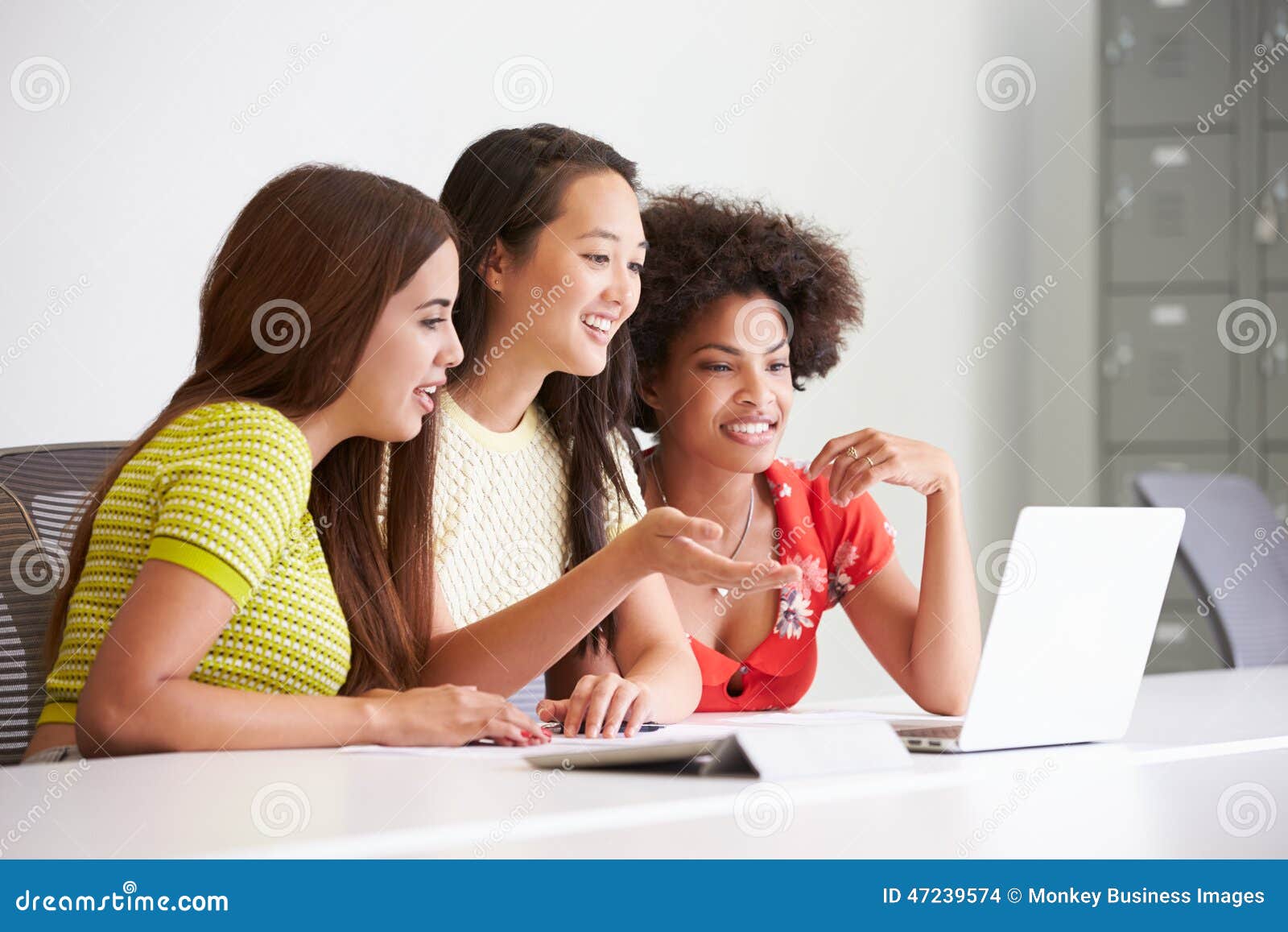 Three Women Working Together in Design Studio Stock Photo - Image of ...