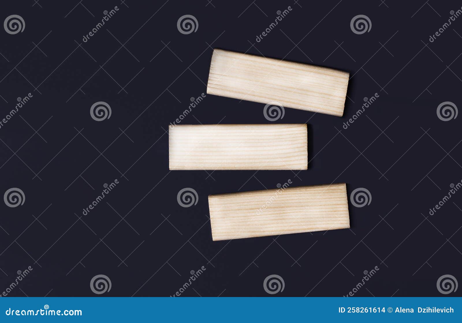 Three Wooden Blocks with Space To Insert Text on a Black Background ...