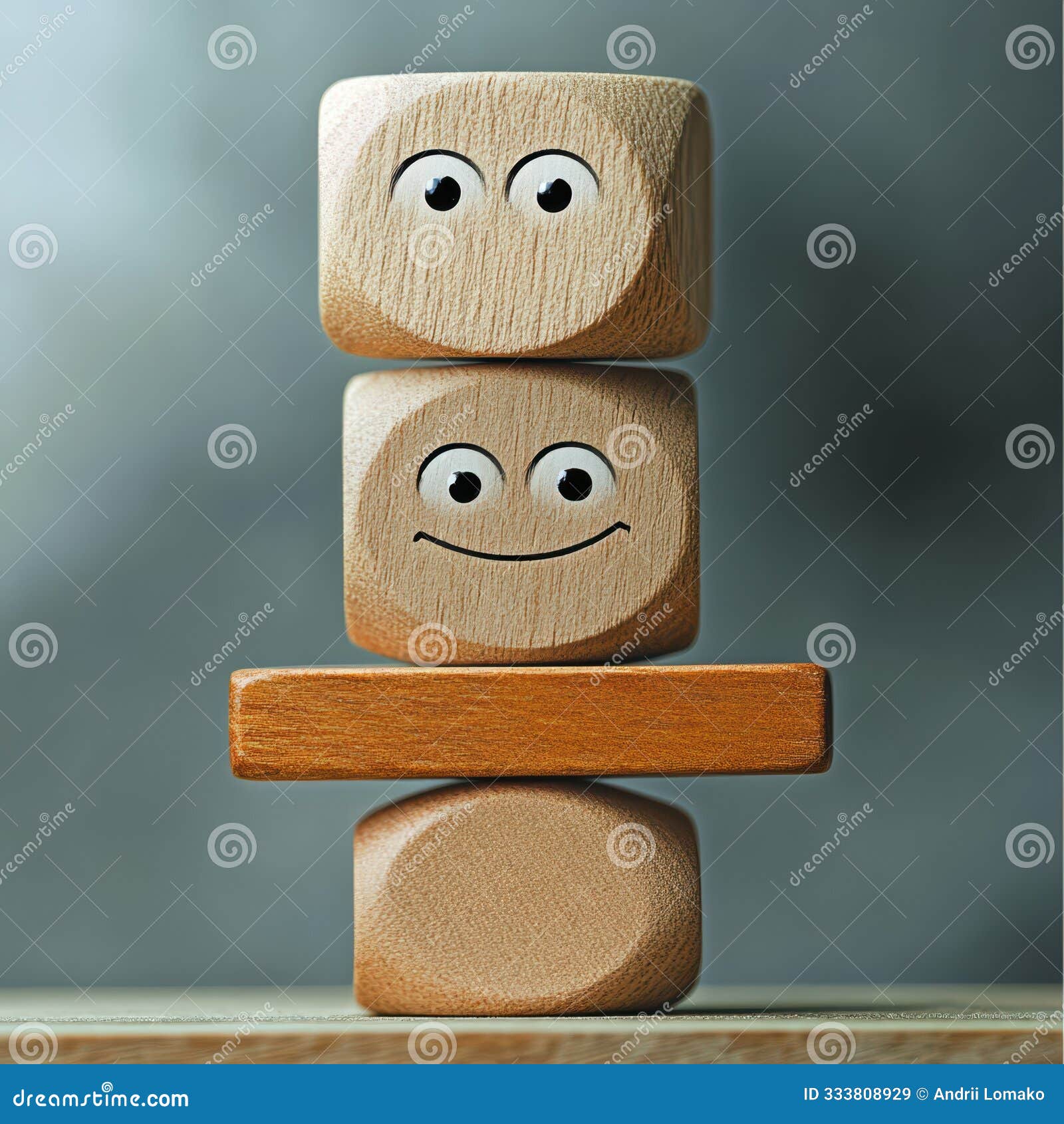 Wooden Stacking Blocks with Smiling Faces on a Neutral Background Stock ...