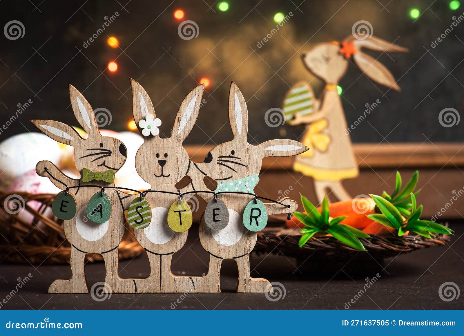 Three Wooden Easter Bunnies with Easter Eggs Stock Image - Image of ...