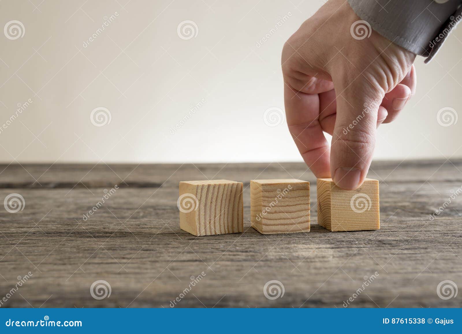 Three Wooden Empty Blocks Being Placed on a Rustic Table Stock Photo ...
