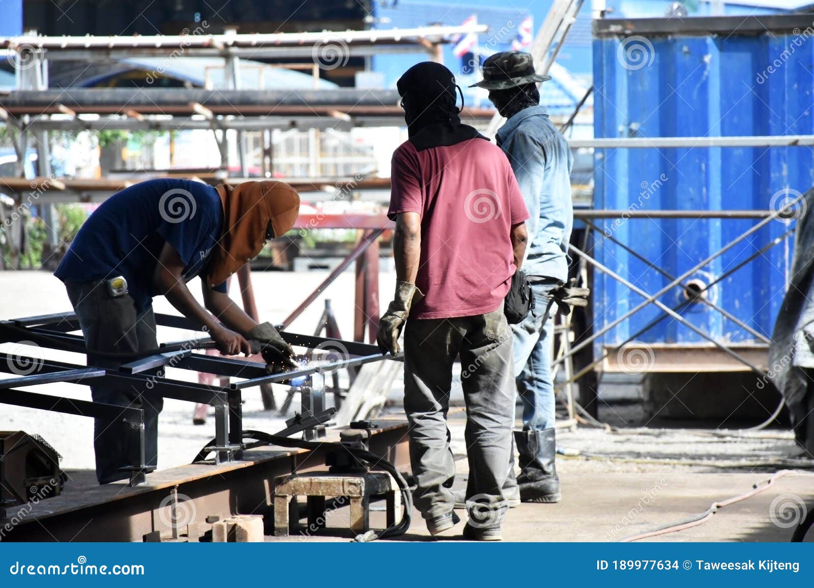 Three Worker Group Working in Steel Fabrication Factory Stock Photo ...