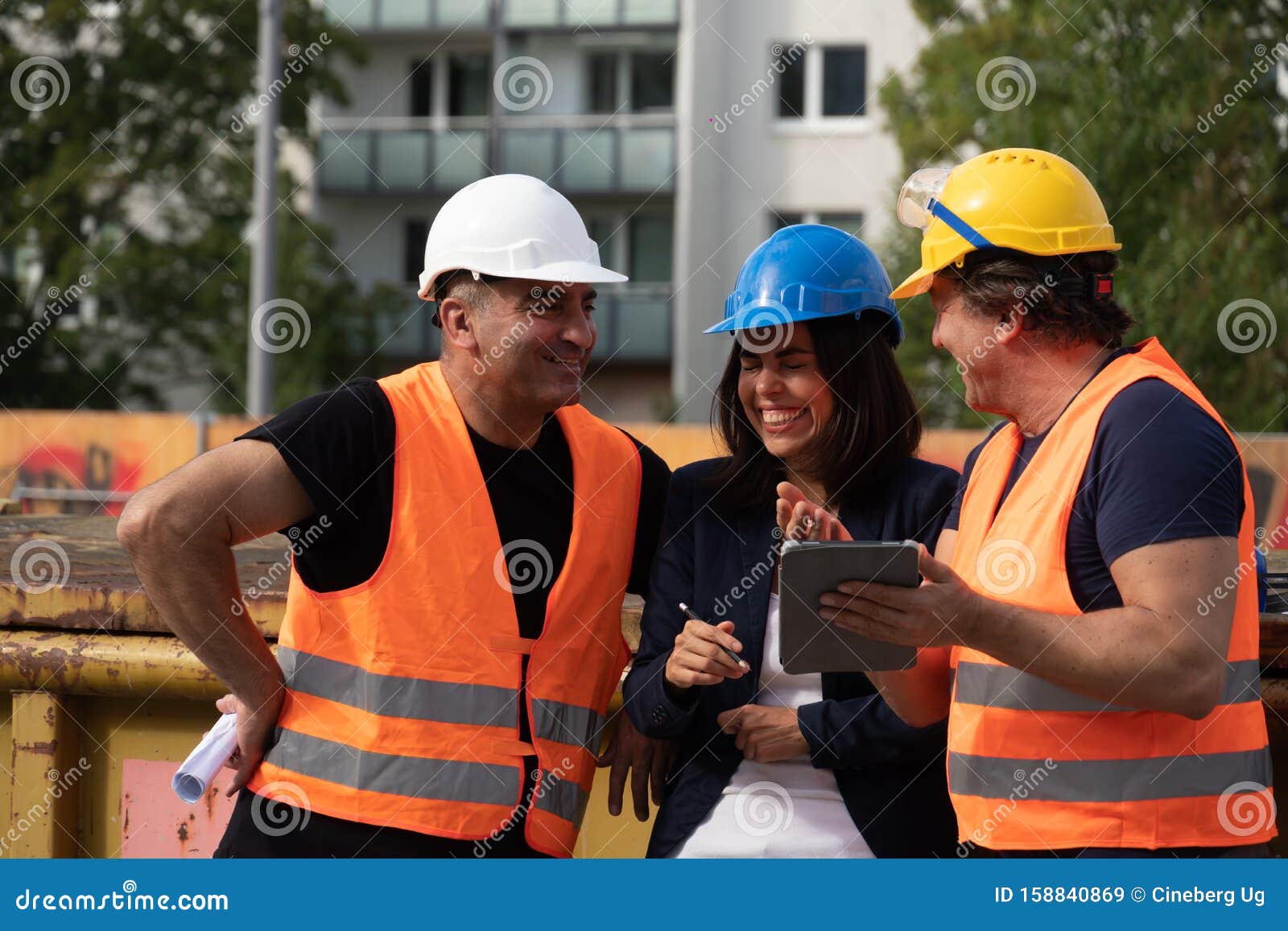 Three Workers on Construction Site Stock Image - Image of industry ...