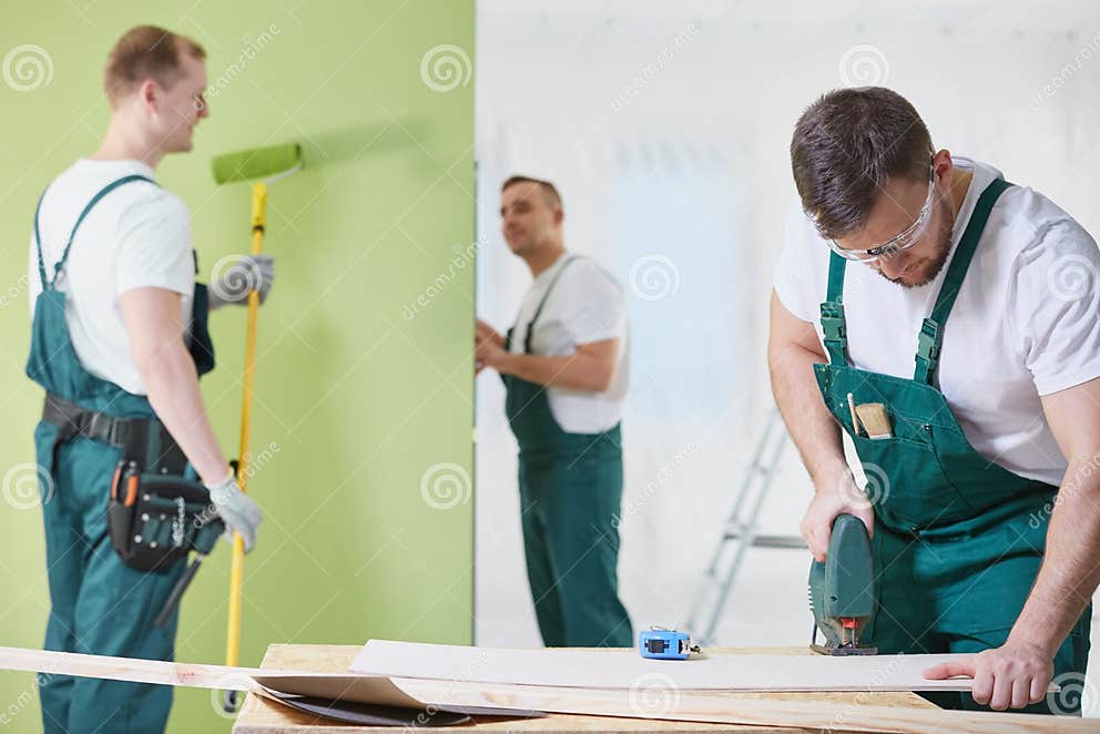 Three Workers Having a Renovation Stock Image - Image of interior ...