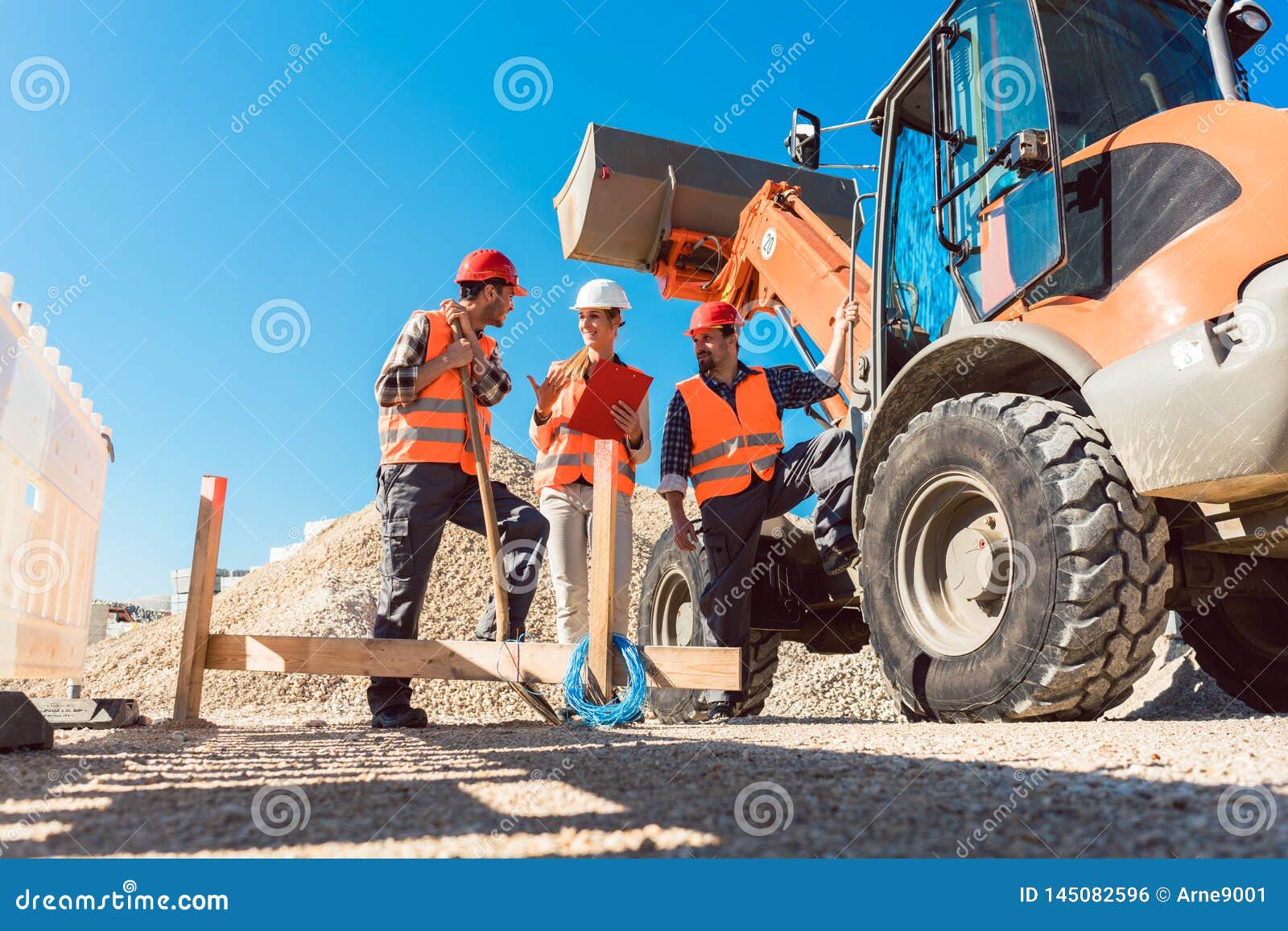 Three Workers on Roadworks Construction Site Stock Photo - Image of ...