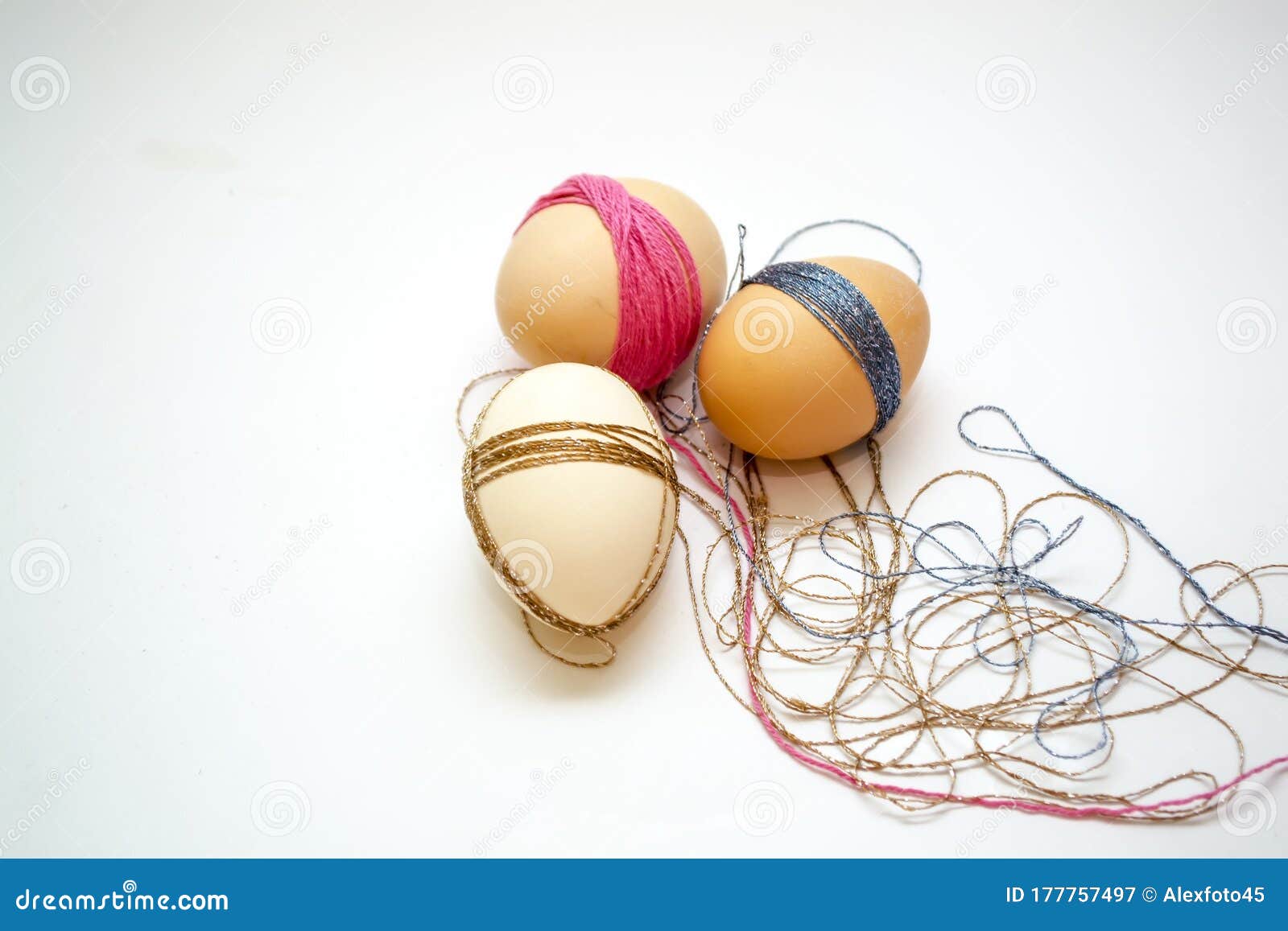 Three Wound Eggs with Thread Stock Image - Image of gold, decorated ...