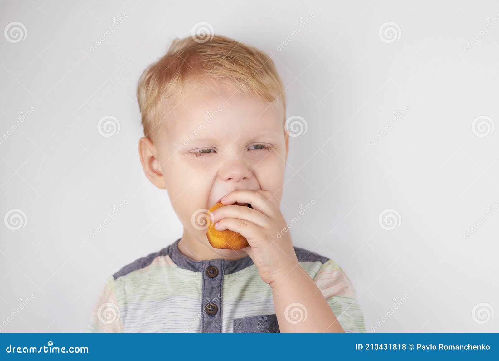 Three-year-old Boy Eats a Pie on a White Background Stock Photo - Image ...