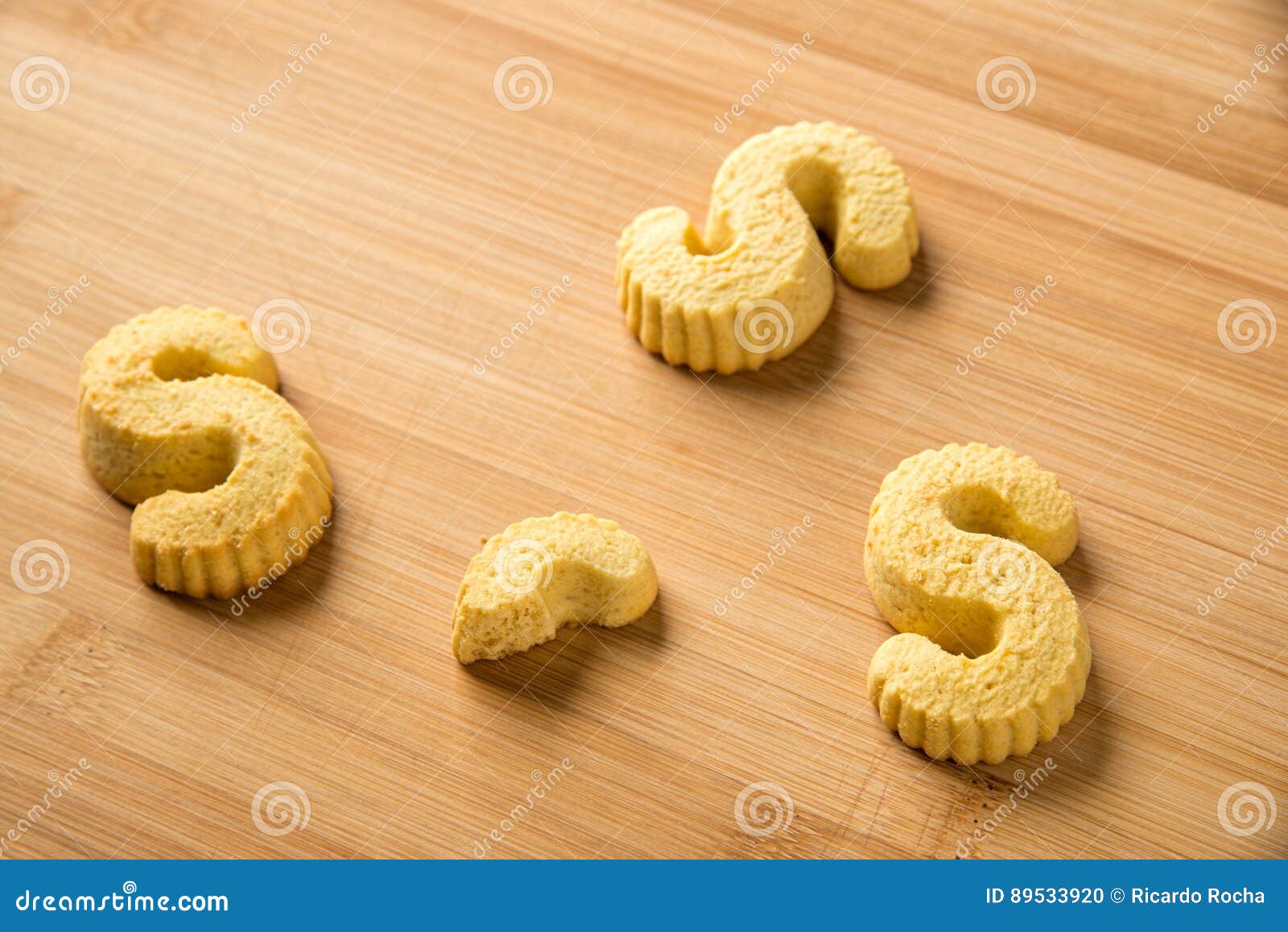 Three yellow biscuits stock photo. Image of shortbread - 89533920