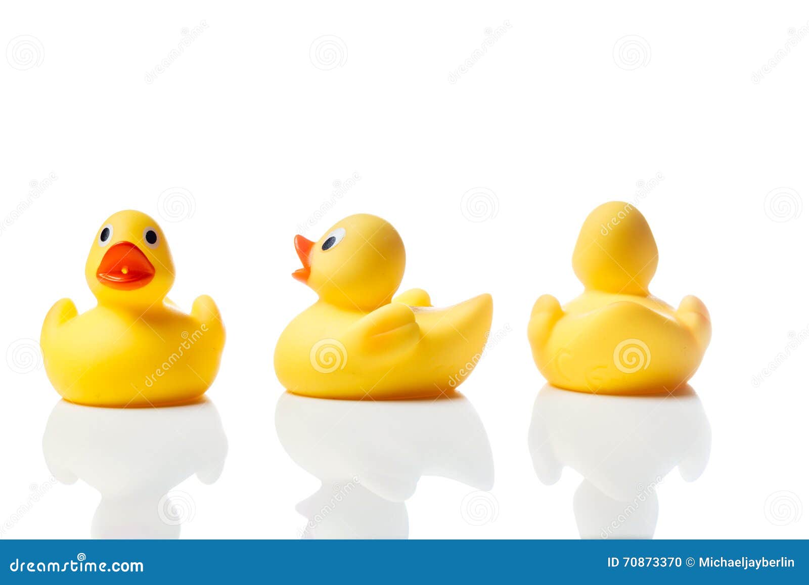 Three Yellow Rubber Ducks on White with Reflection Stock Photo - Image ...