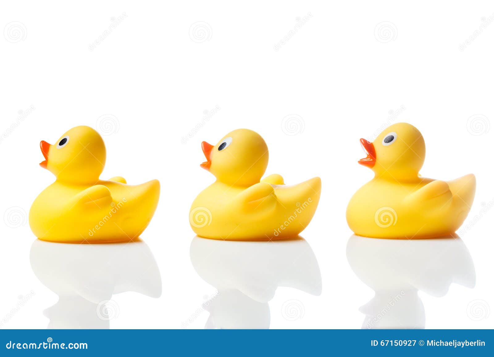 Three Yellow Rubber Ducks on White with Reflection Stock Image - Image ...