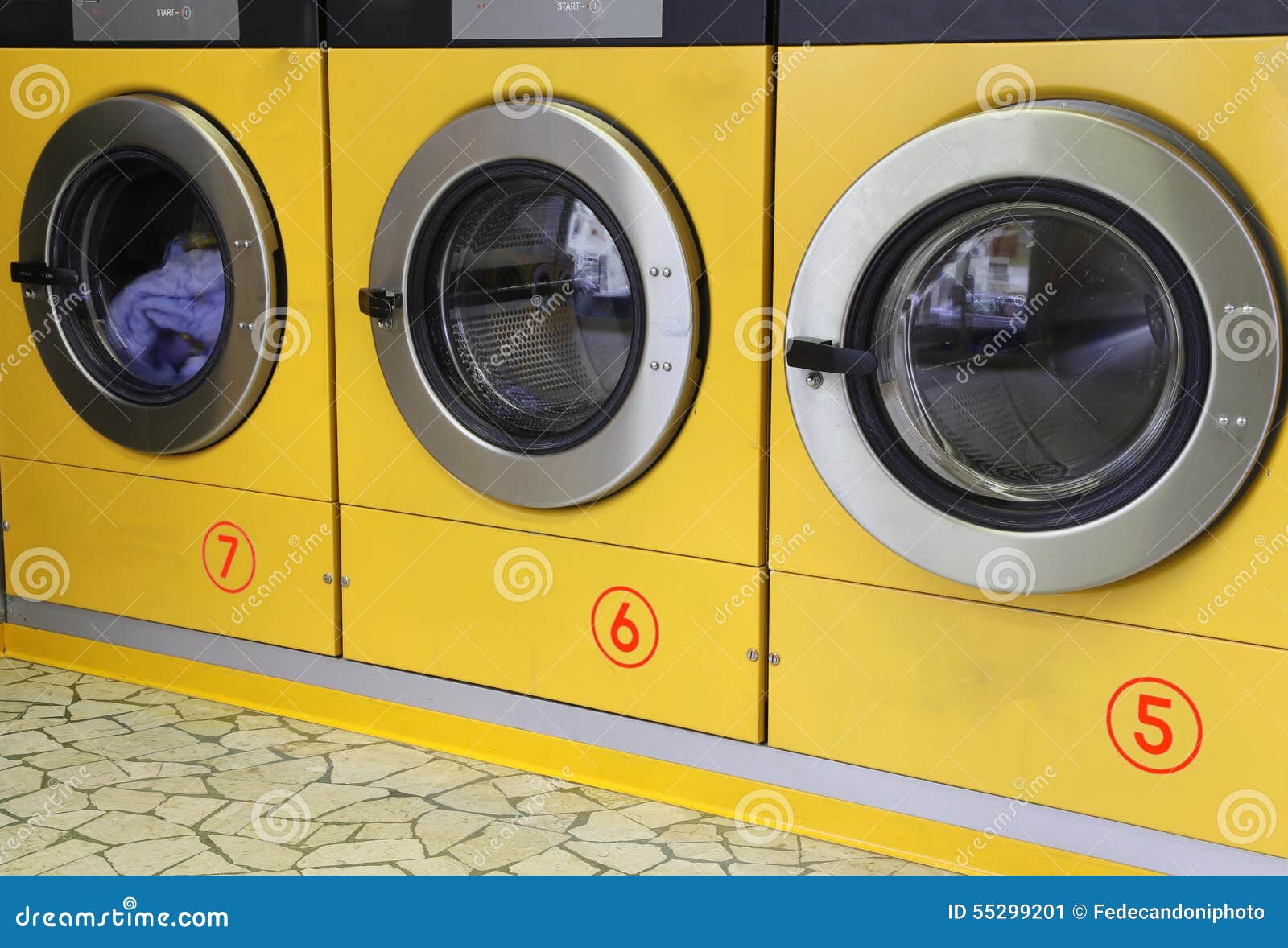 Three Yellow Washing Machines in Laundromats Stock Image - Image of ...