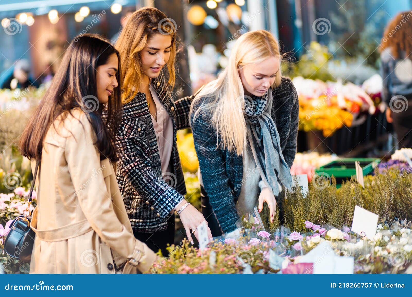 Young Friends in the Garden Center Stock Image - Image of females ...