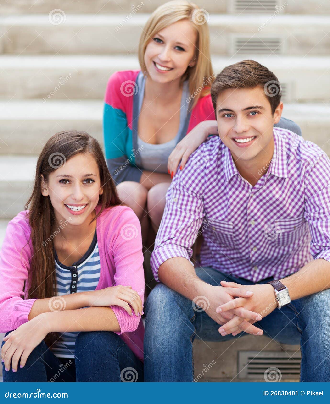 Three Young Friends Sitting Together Stock Image - Image of sitting ...