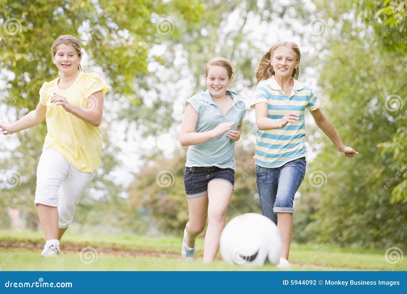 Three Young Girl Friends Playing Soccer Stock Photo - Image of length ...