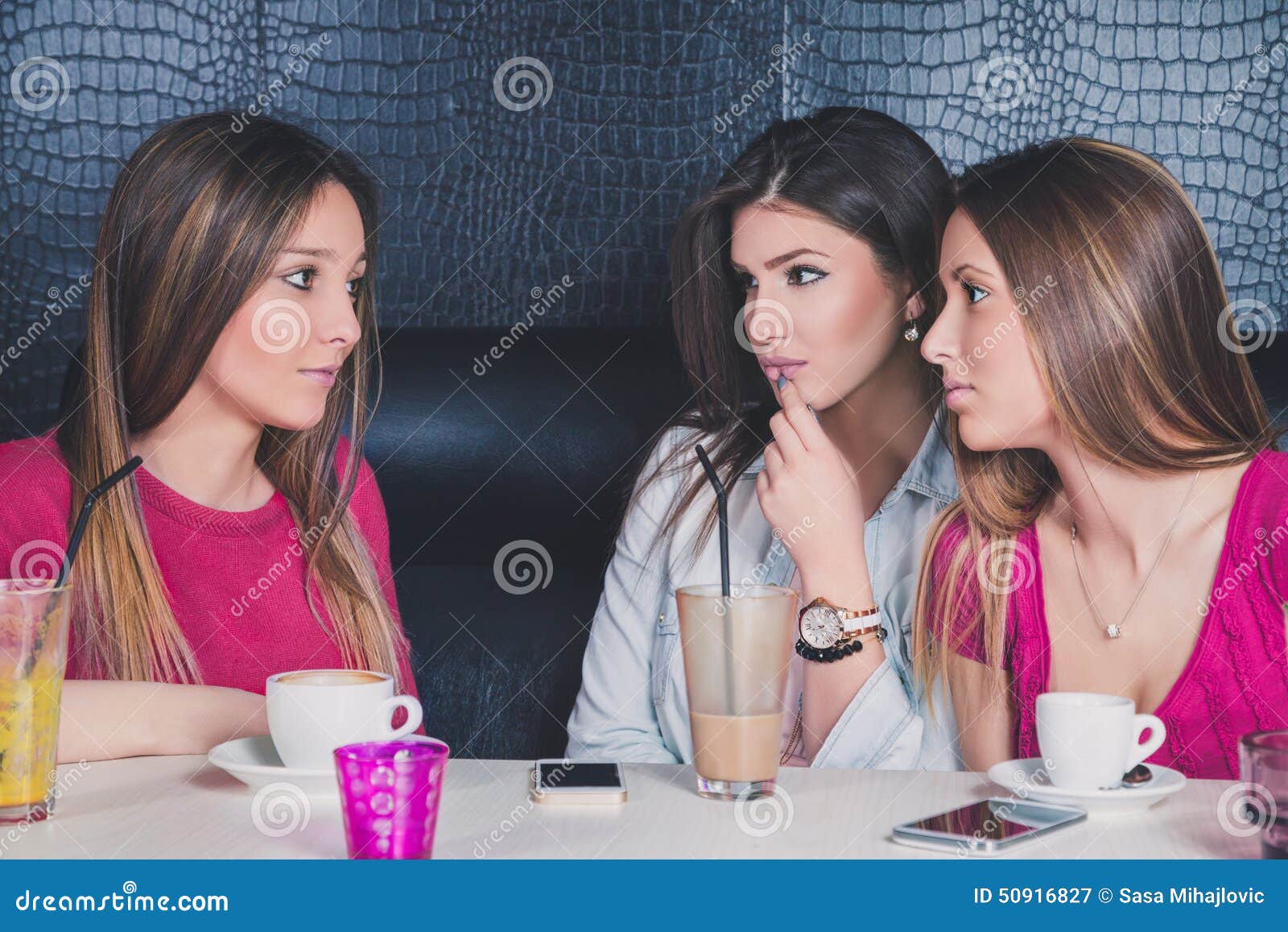 Three Young Girls Having Serious Conversation Stock Image - Image of ...