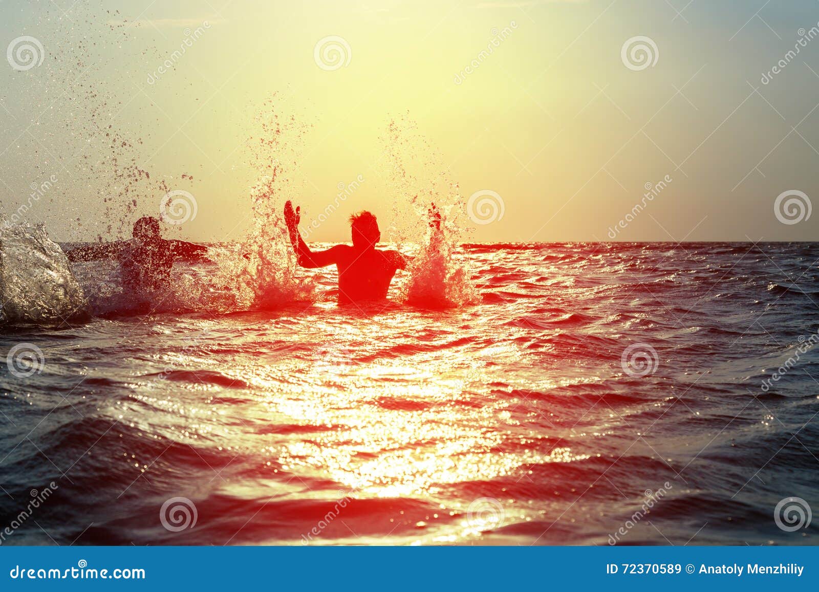 Three Young Men Splashing Water in the Sea Stock Image - Image of jump ...
