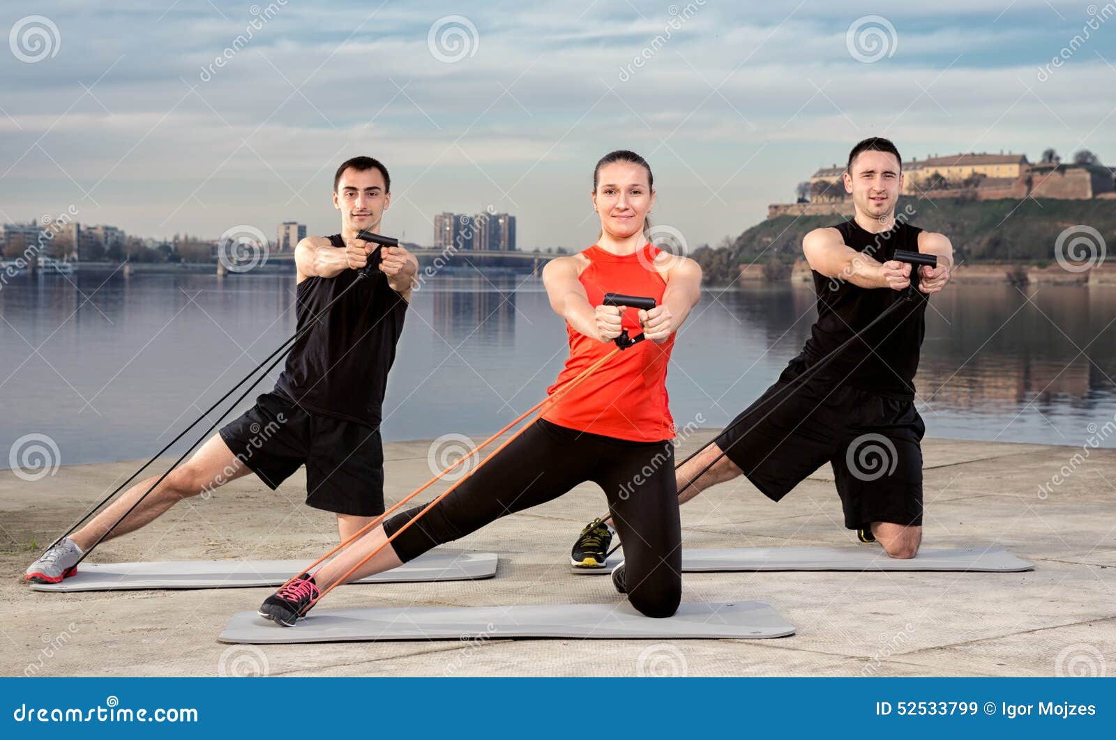 Three Young People Exercising Stock Image - Image of body, girl: 52533799