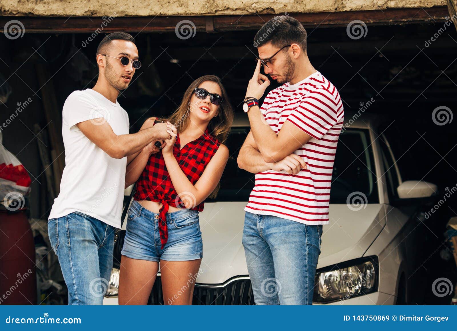 Three Friends Talking Outside Front of Garage Stock Image - Image of ...