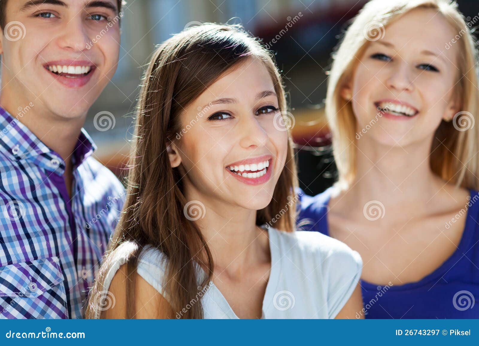 Three young people smiling stock image. Image of girl - 26743297
