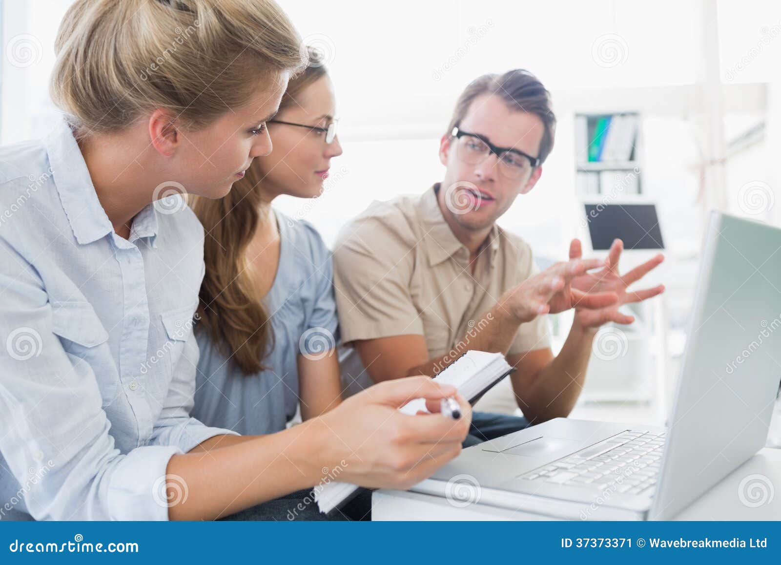 Three Young People Working on Computer Stock Image - Image of sitting ...