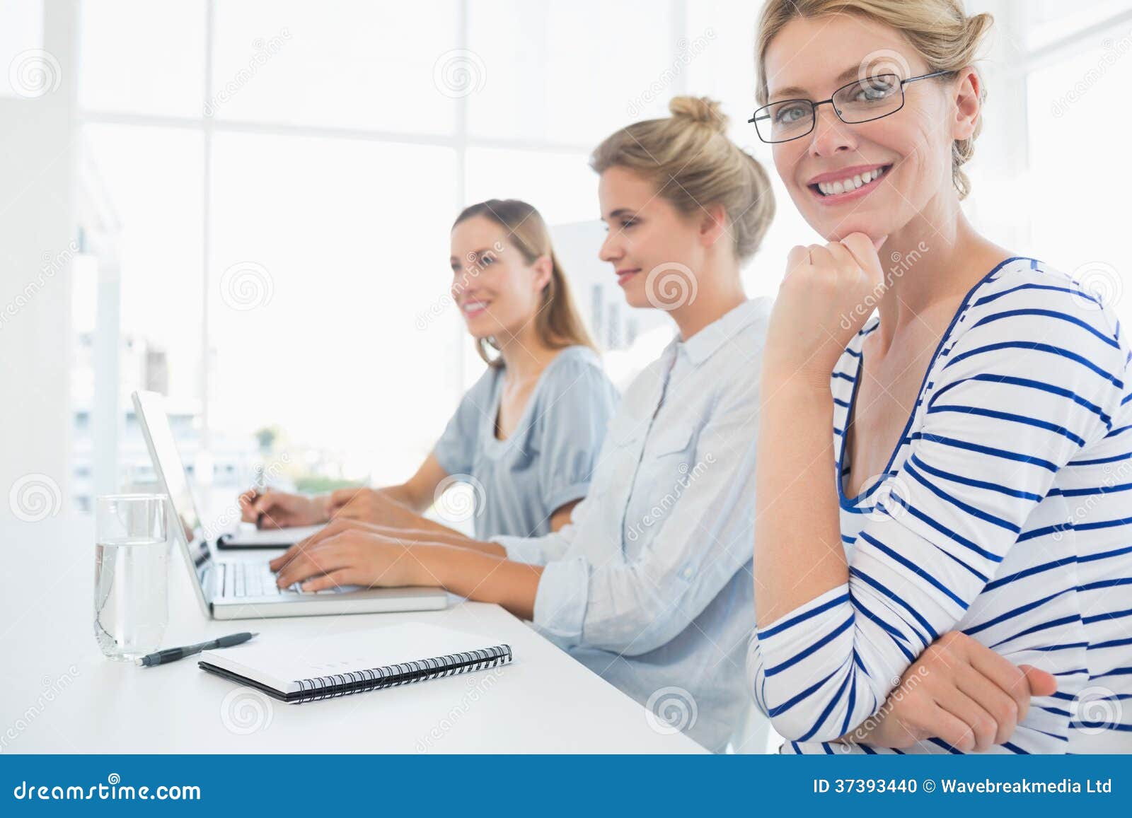 Three Young People Working in Office Stock Photo - Image of indoors ...
