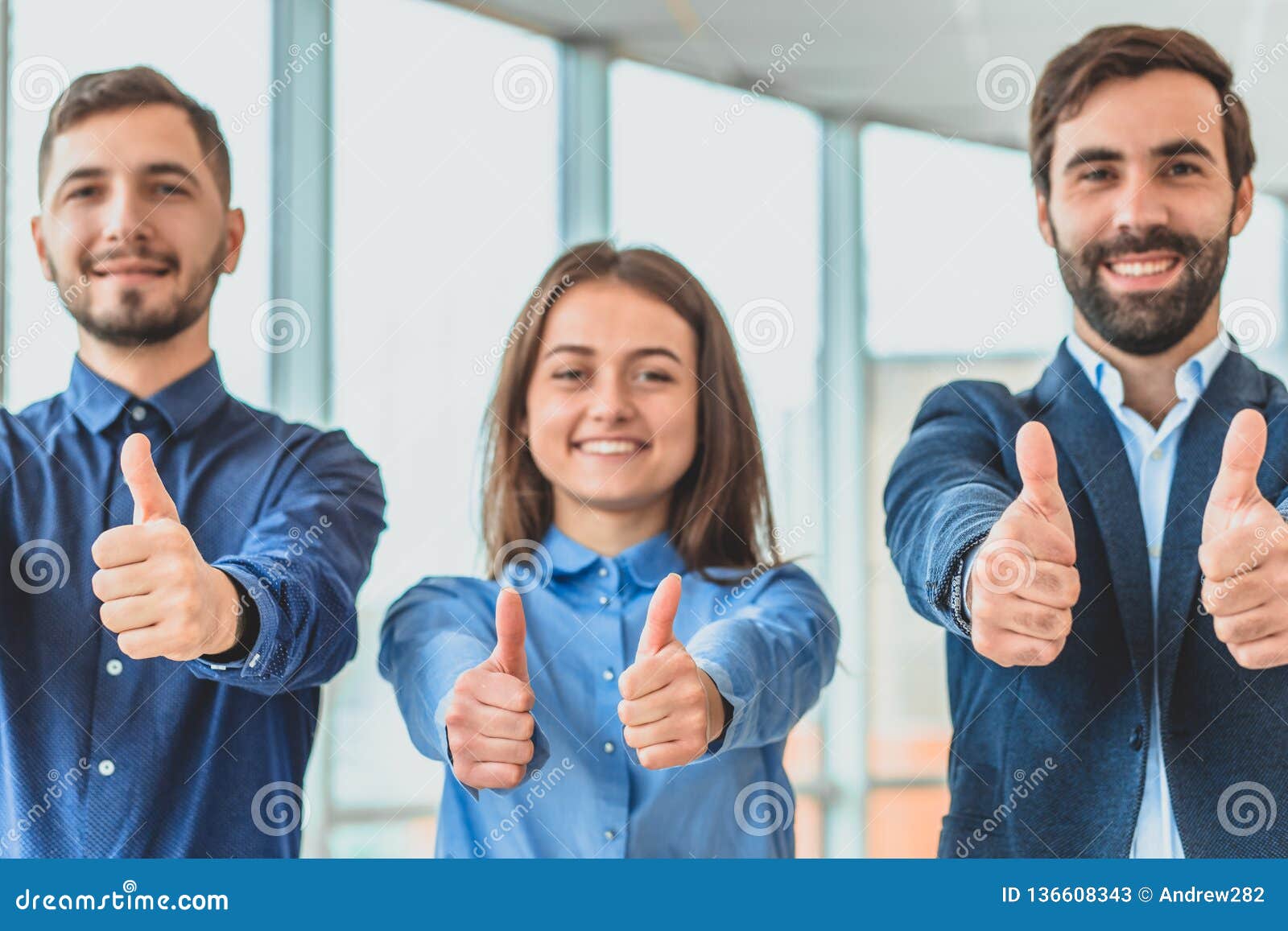 Three Young Serious Partners in the Office. during this, they are ...