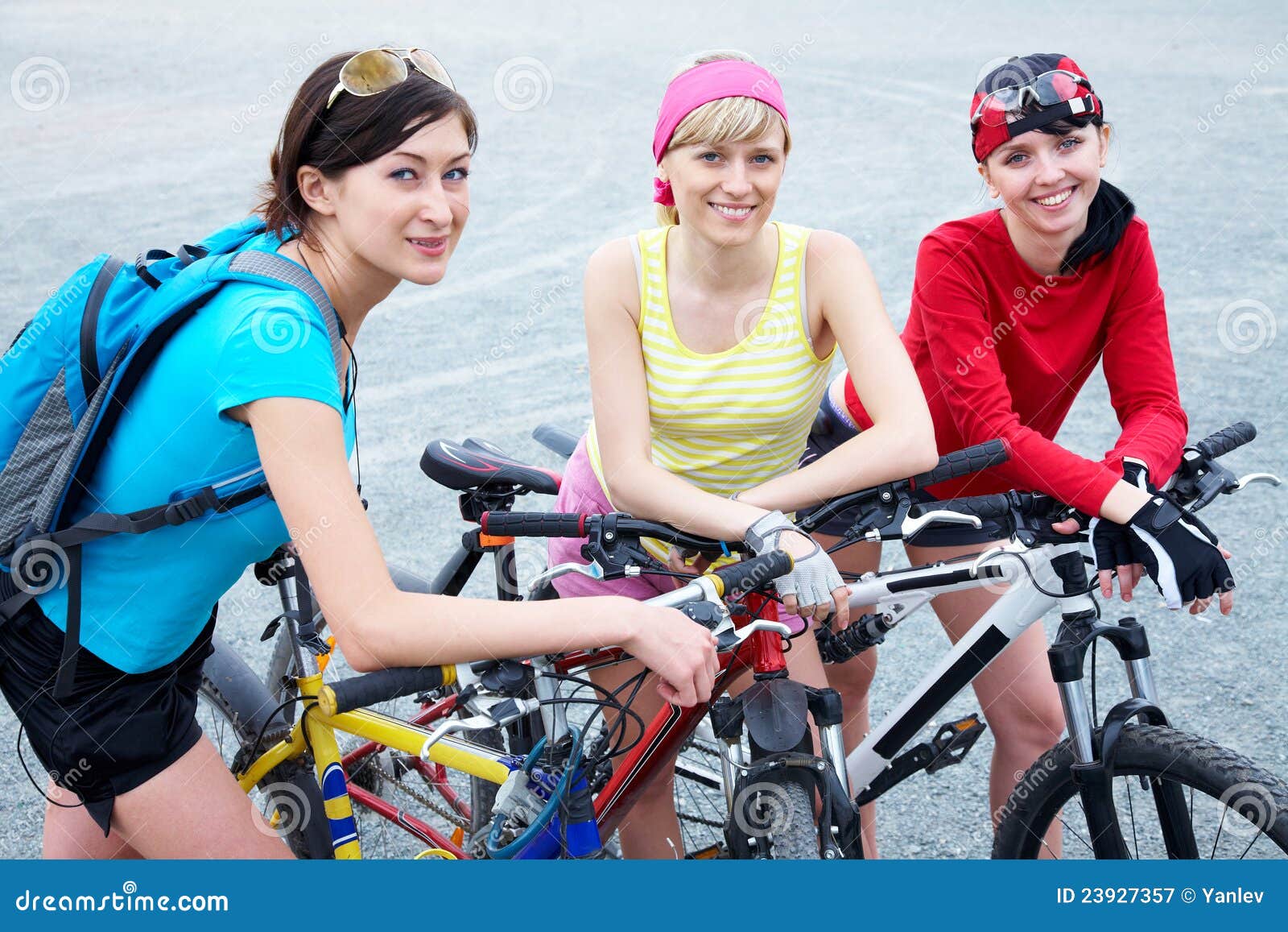 Three Young Women on Bicycle Stock Image - Image of motion, rest: 23927357