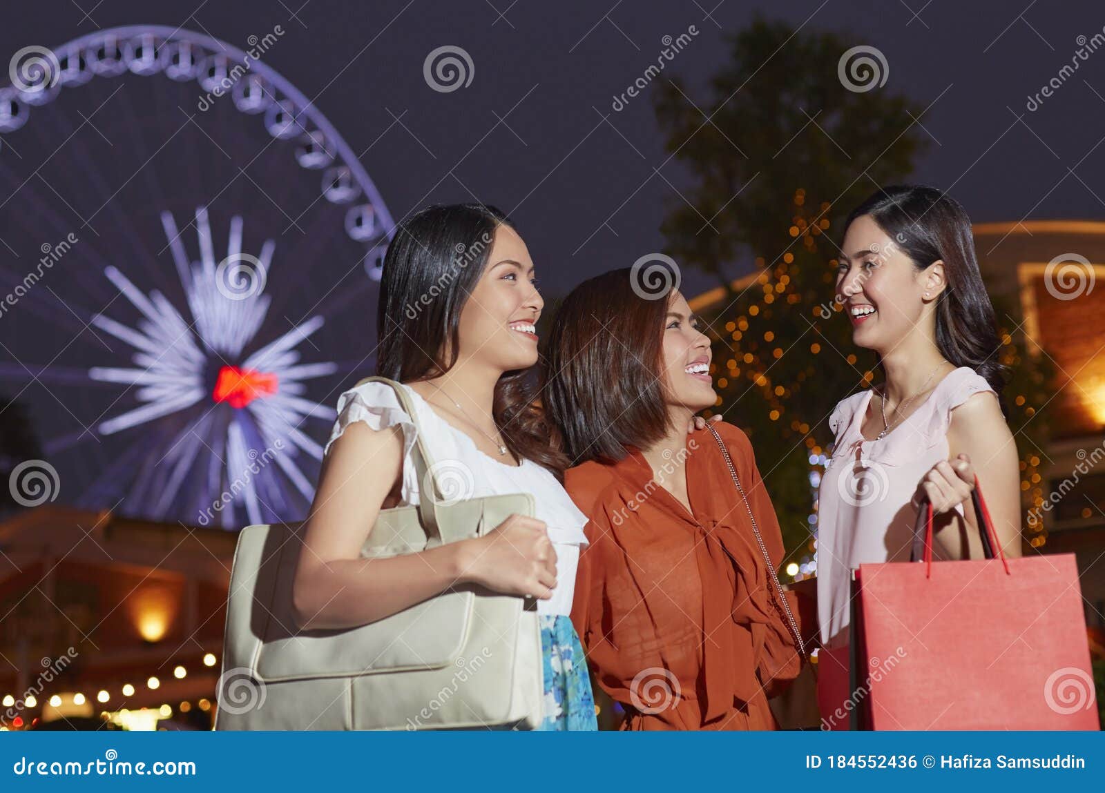 Three Young Women Hanging Out at Night Stock Photo - Image of color ...
