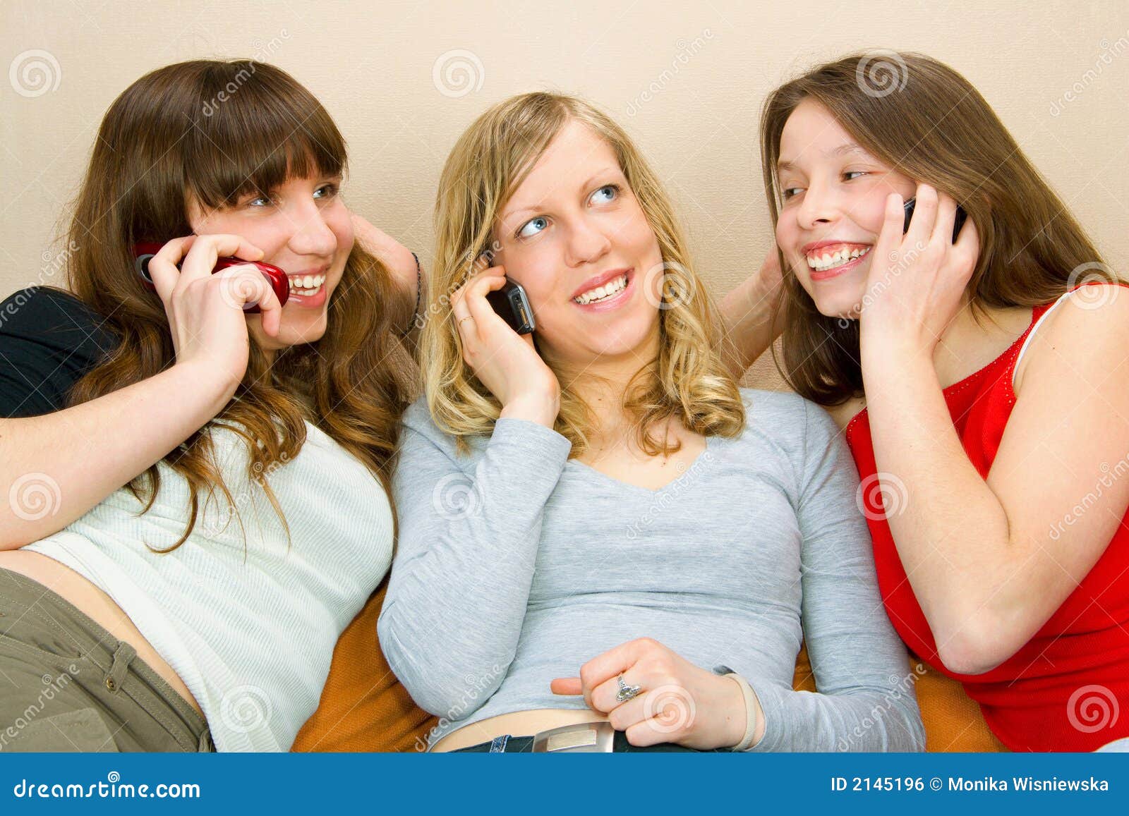 Three Young Women with Phones Stock Photo - Image of females, ladies ...