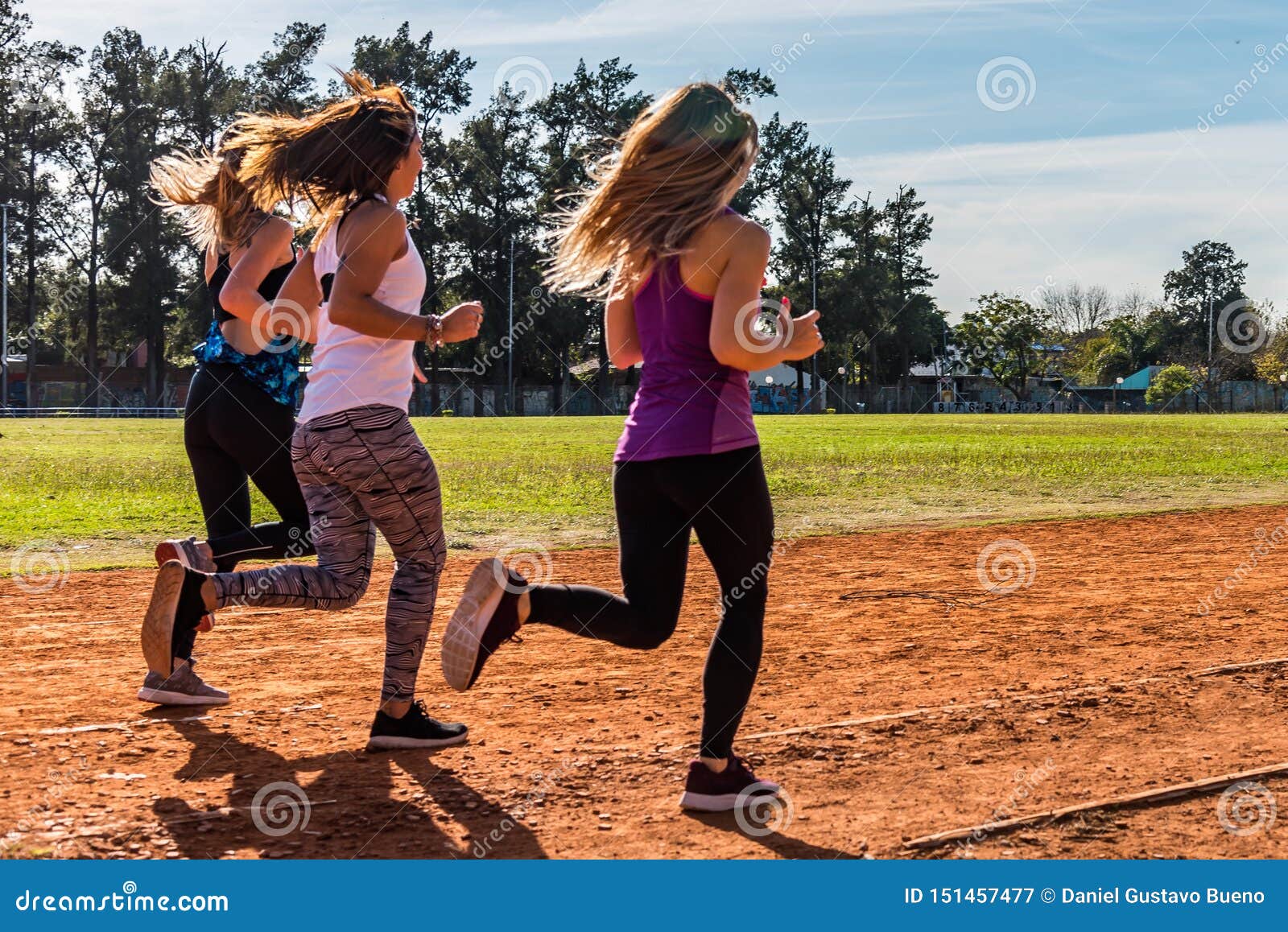 Three Young Women Running on the Running Track Stock Image - Image of ...