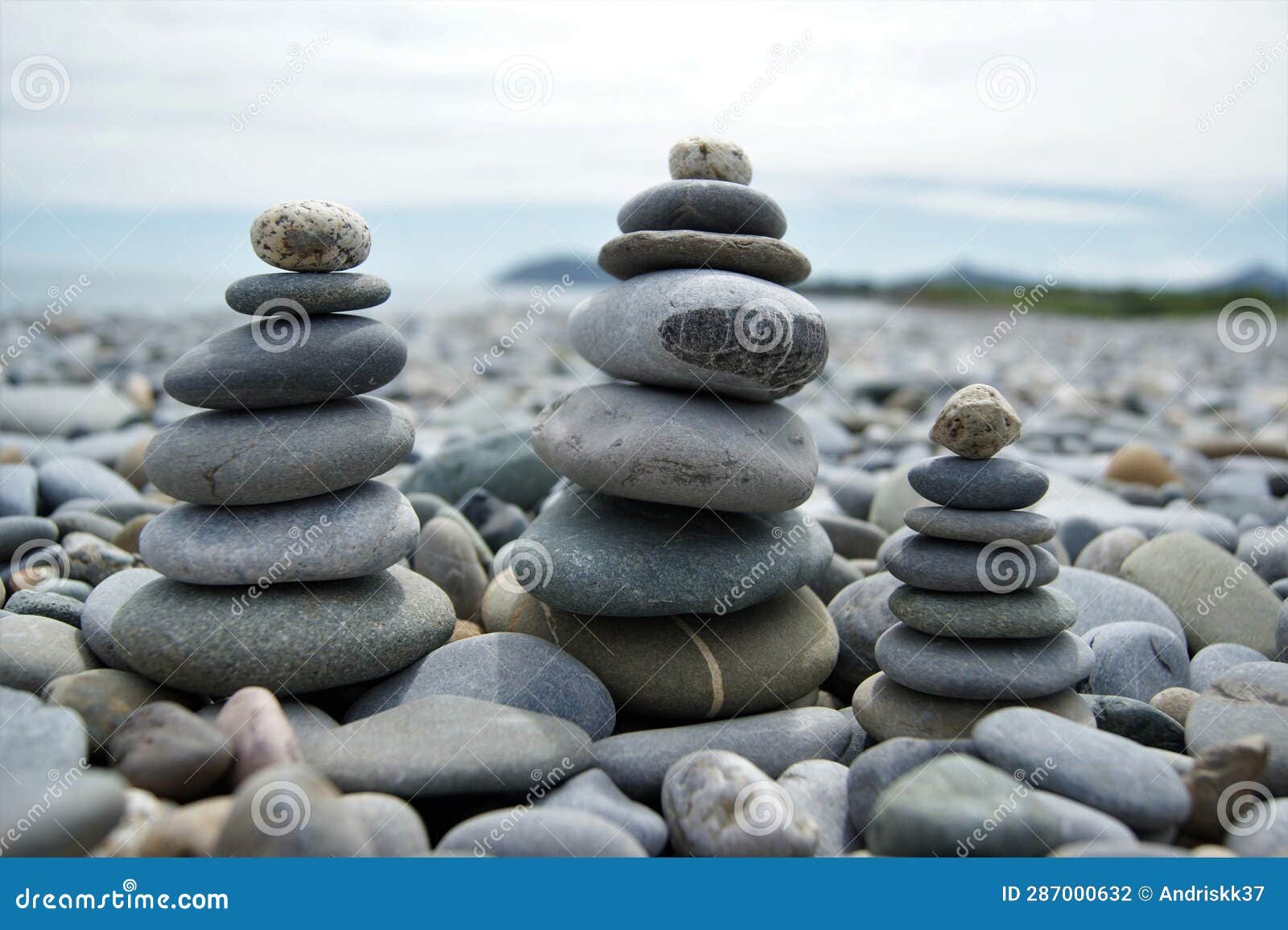 Three Zen Towers on a Rocky Beach. Stock Photo - Image of background ...