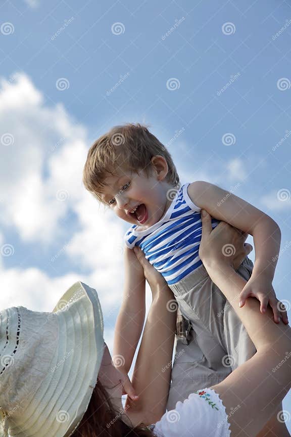 Throw a child stock image. Image of color, playful, bonding - 24568233