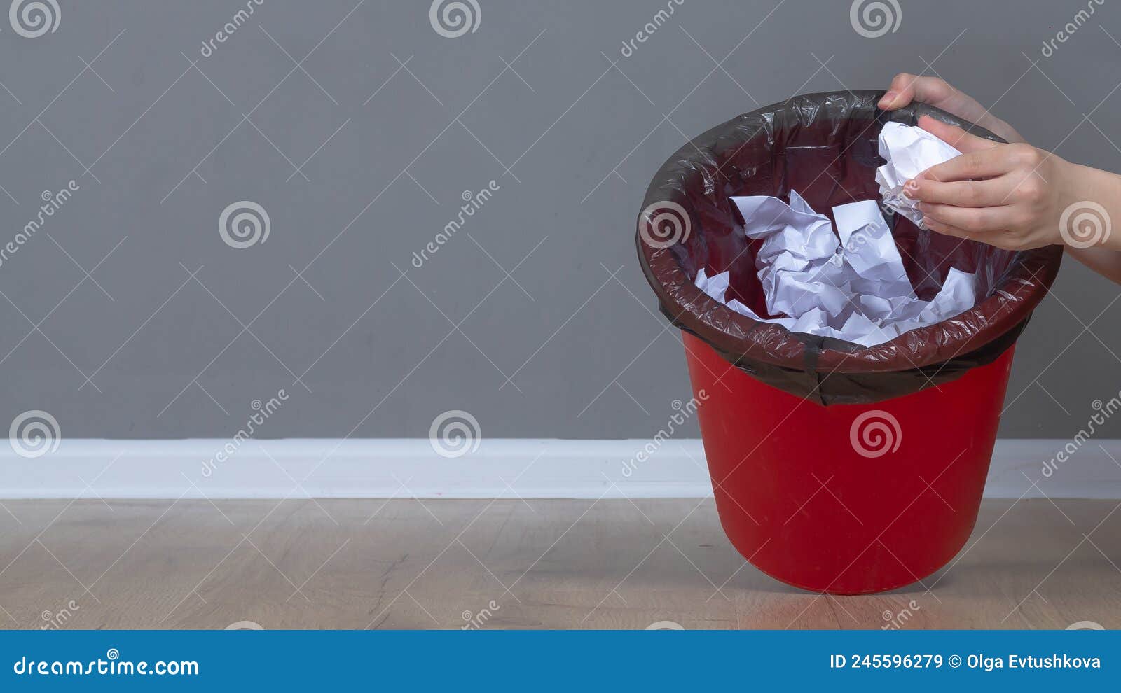 Throw Crumpled Paper in a Red Trash Can Stock Image - Image of ...