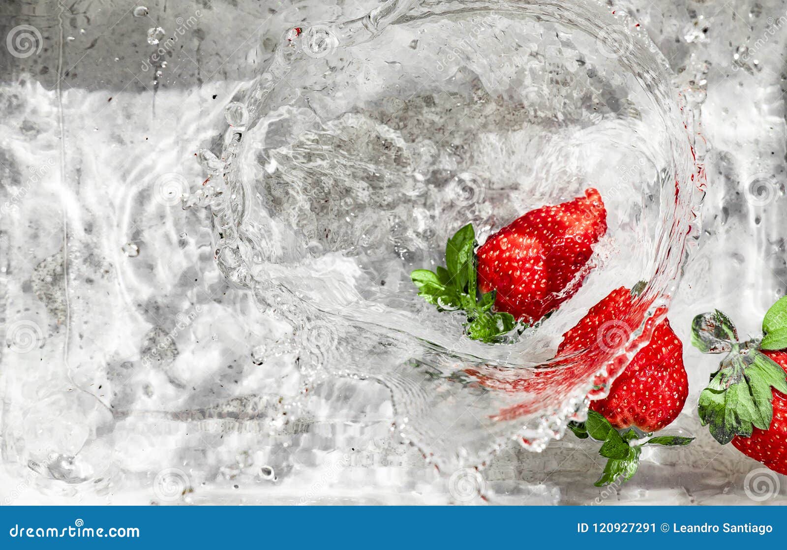 Throwing Strawberry Red into the Water Stock Image - Image of ...