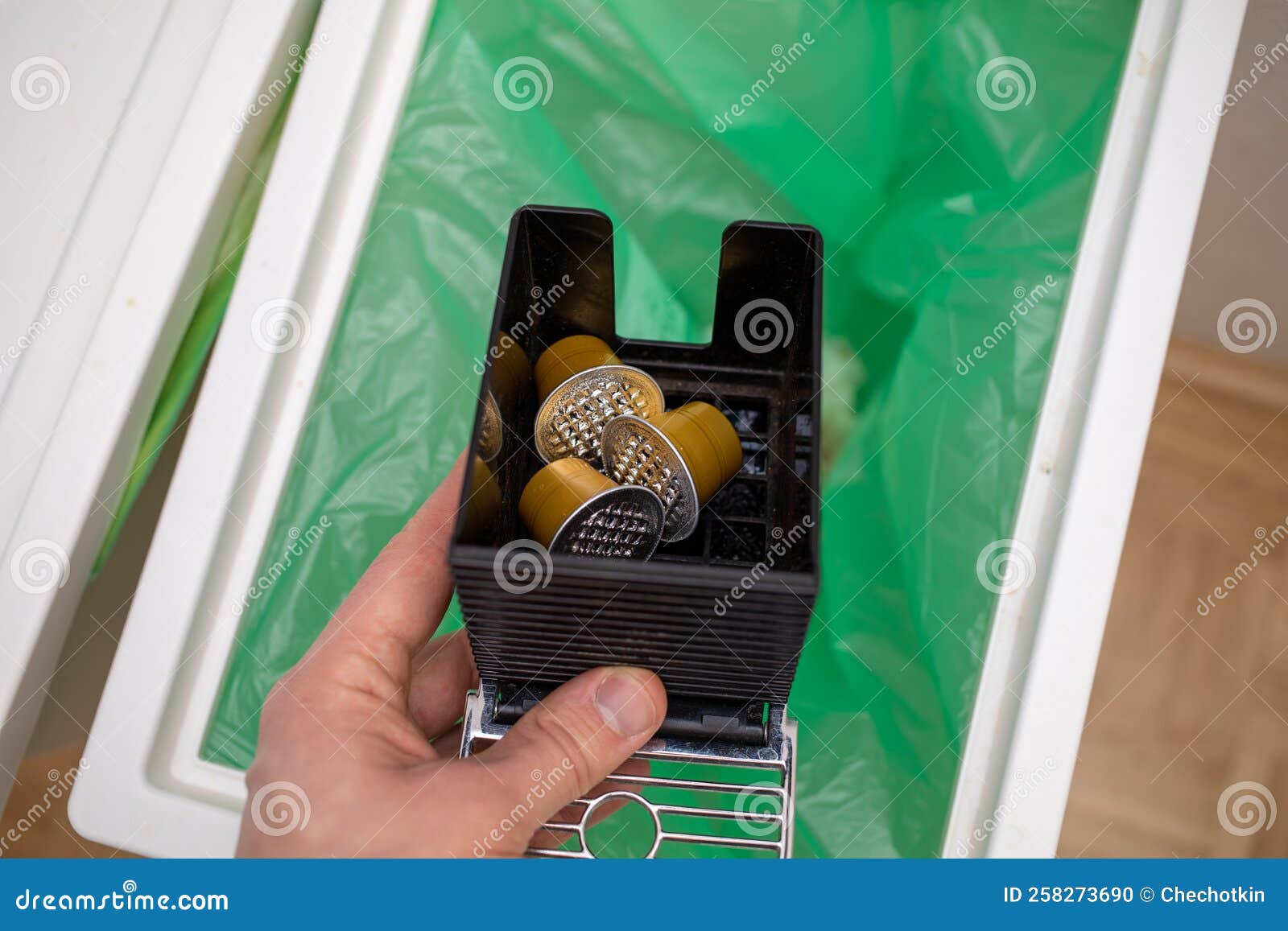Throwing Coffee Capsules in the Trash Bin Stock Photo - Image of ...