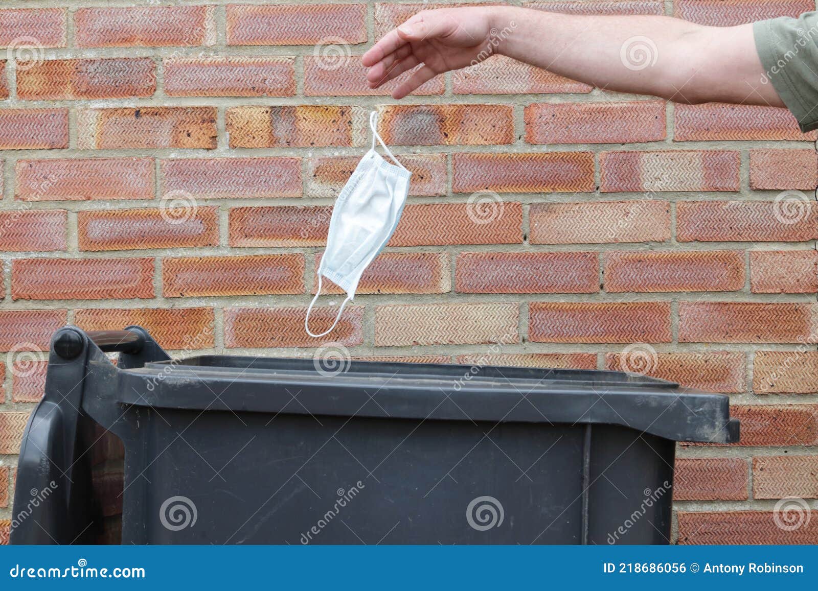 Throwing Face Mask into a Bin Stock Photo - Image of virus, infectious ...
