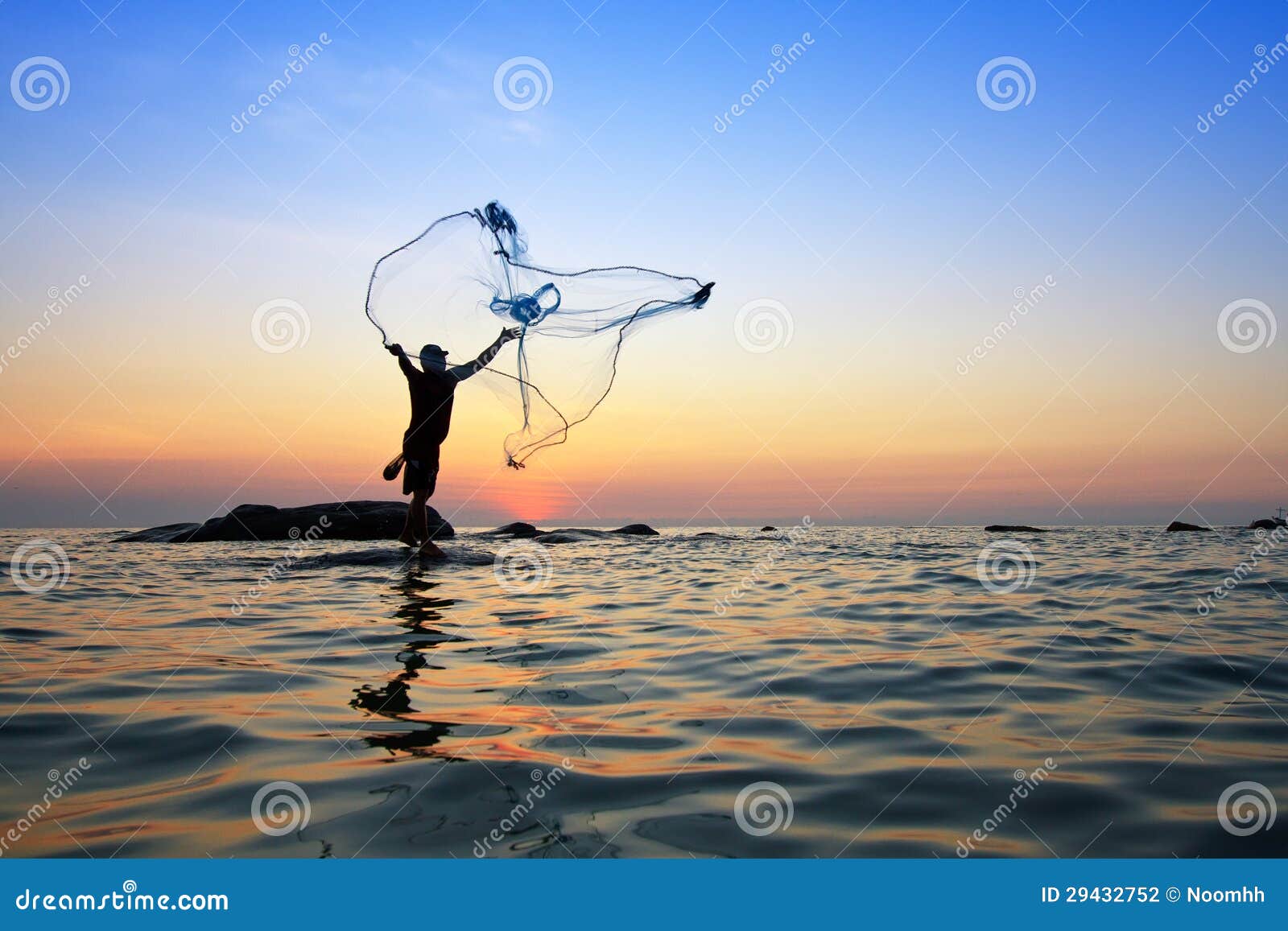 Throwing Fishing Net during Sunrise Stock Photo - Image of silhouette ...