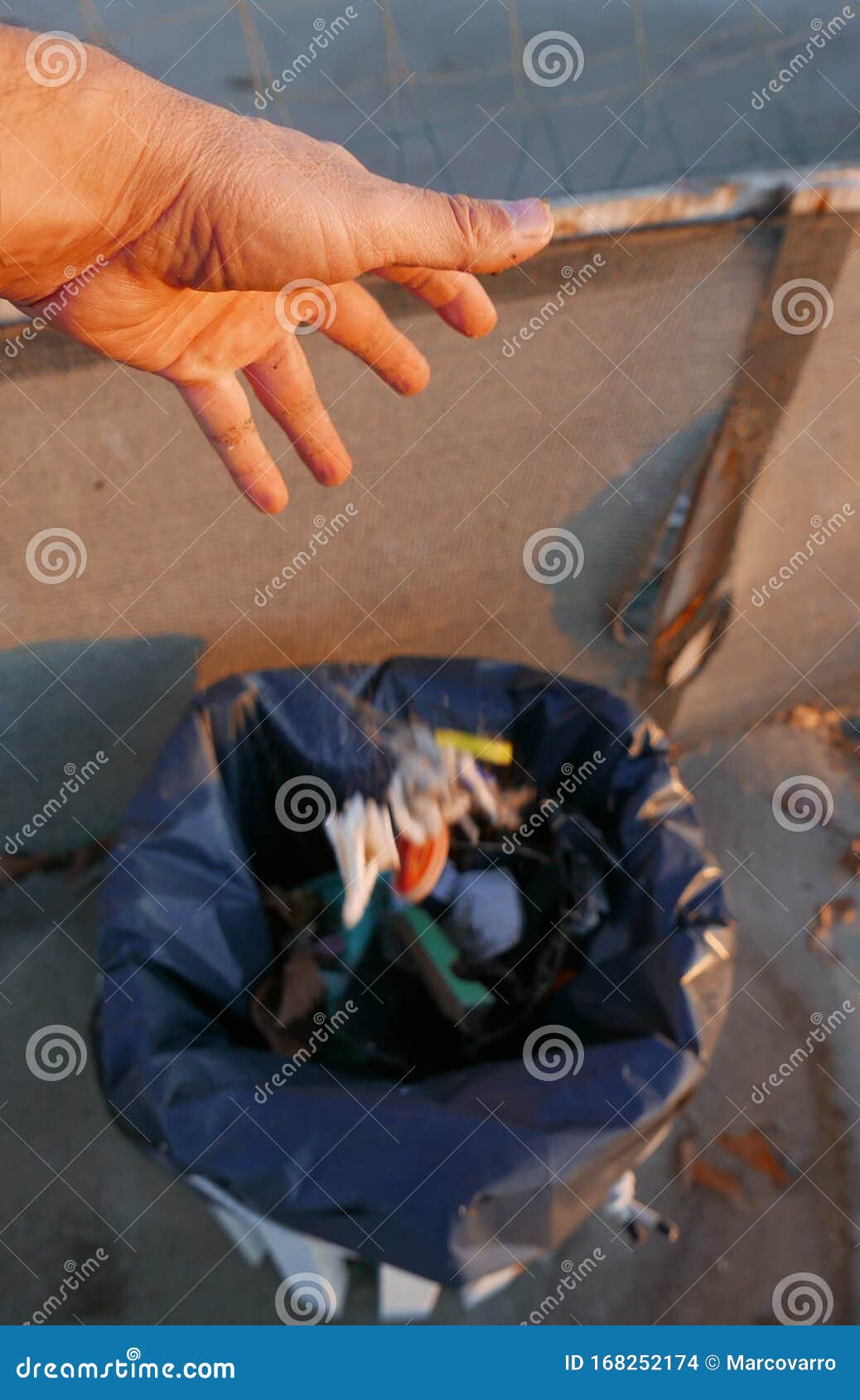 Throwing garbage trash bin stock photo. Image of garbage - 168252174