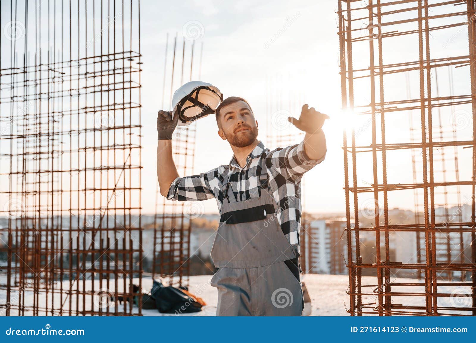 Throwing the Hard Hat. Man is Working on the Construction Site at ...