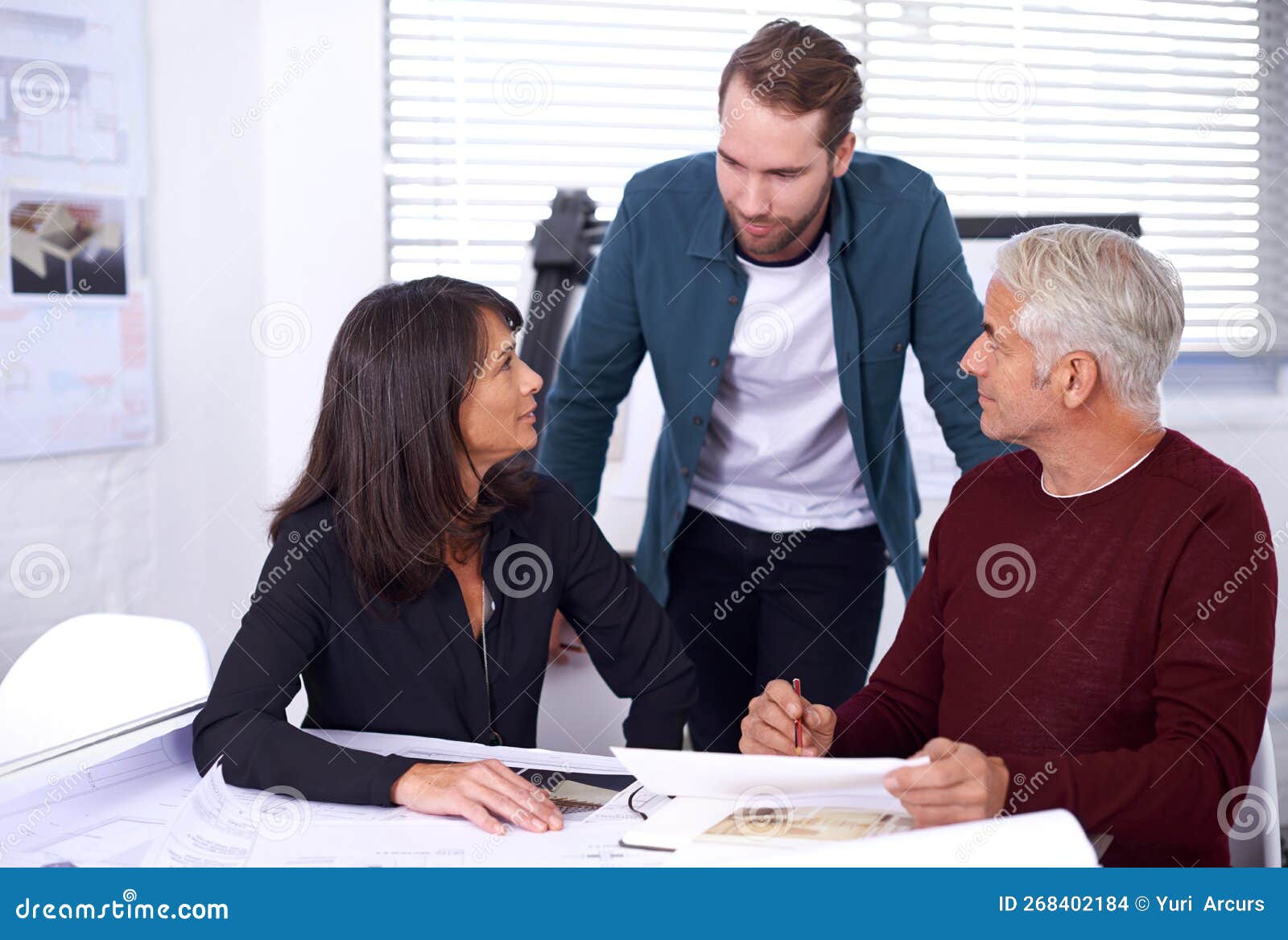 Throwing Ideas Around before Drawing Up the Plans. Three Architects ...