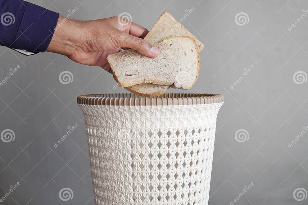 Throwing Old Bread in a Garbage Bin Stock Photo - Image of reusing ...