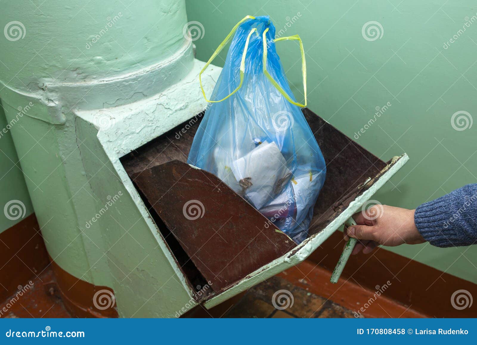 Throwing Out Garbage Packed in a Garbage Bag Using a Home Trash Chute ...