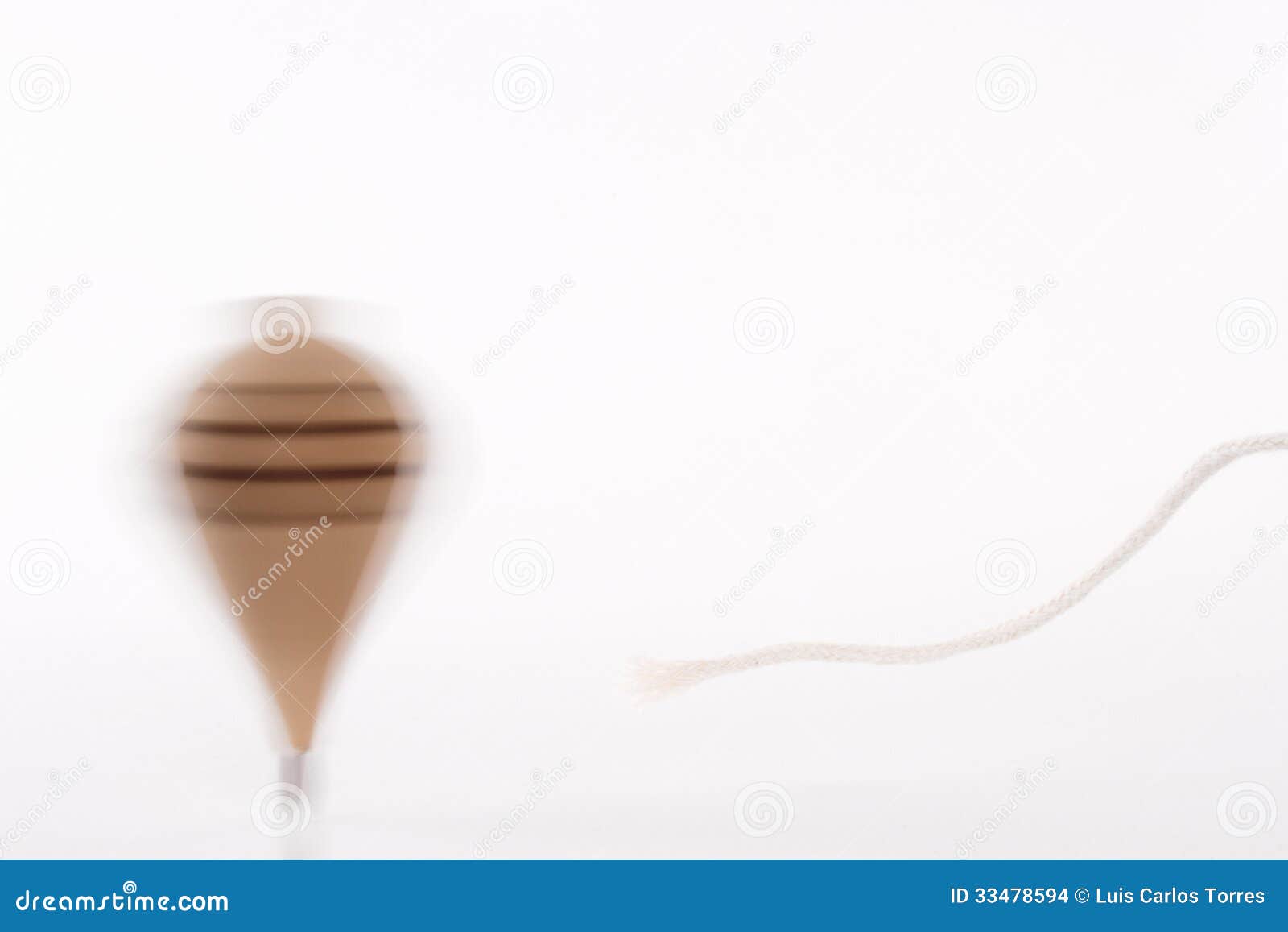 Throwing a spinning top stock photo. Image of wood, spinning - 33478594